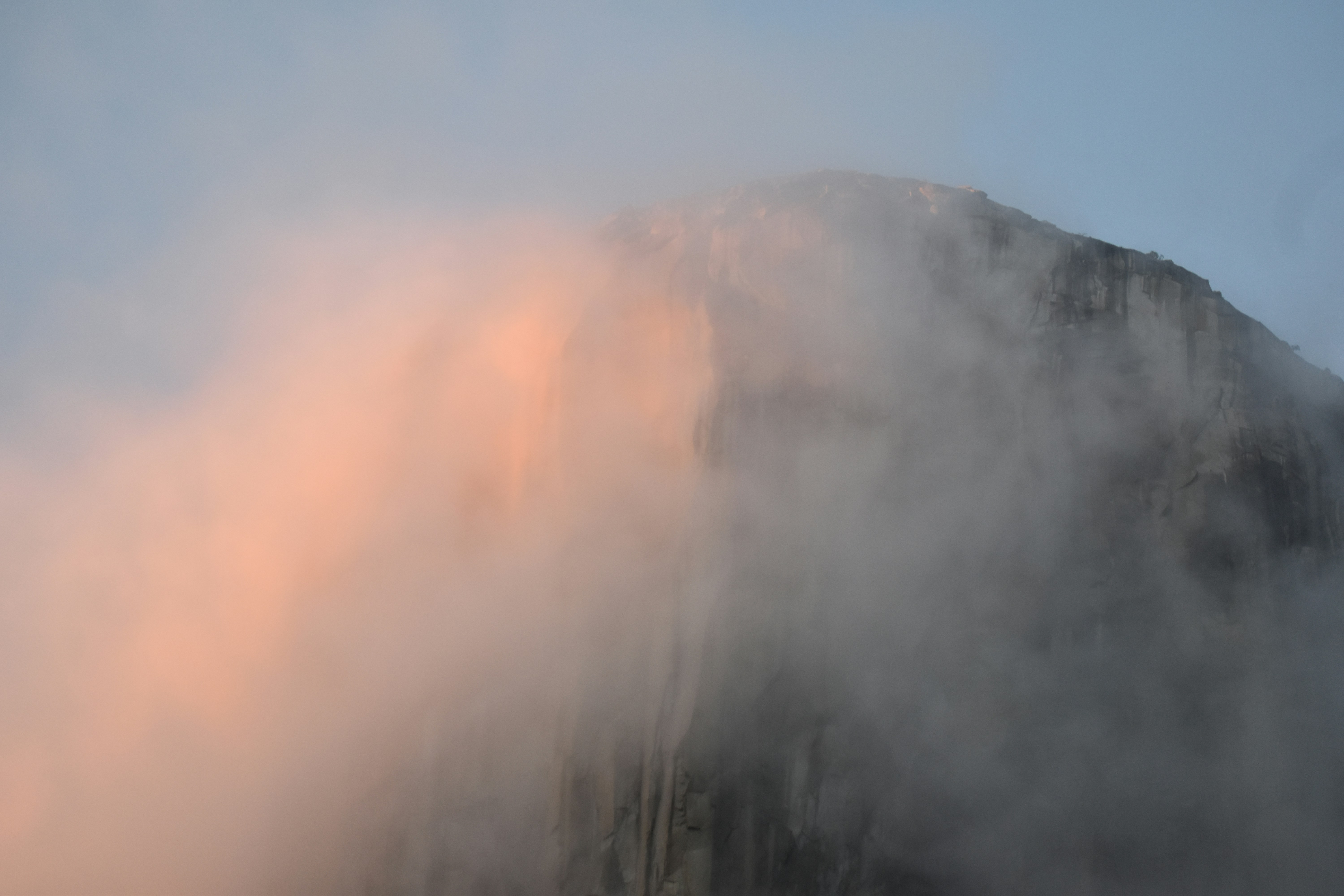 Dawn Mist Clings to a Quiet Alpine Ridge