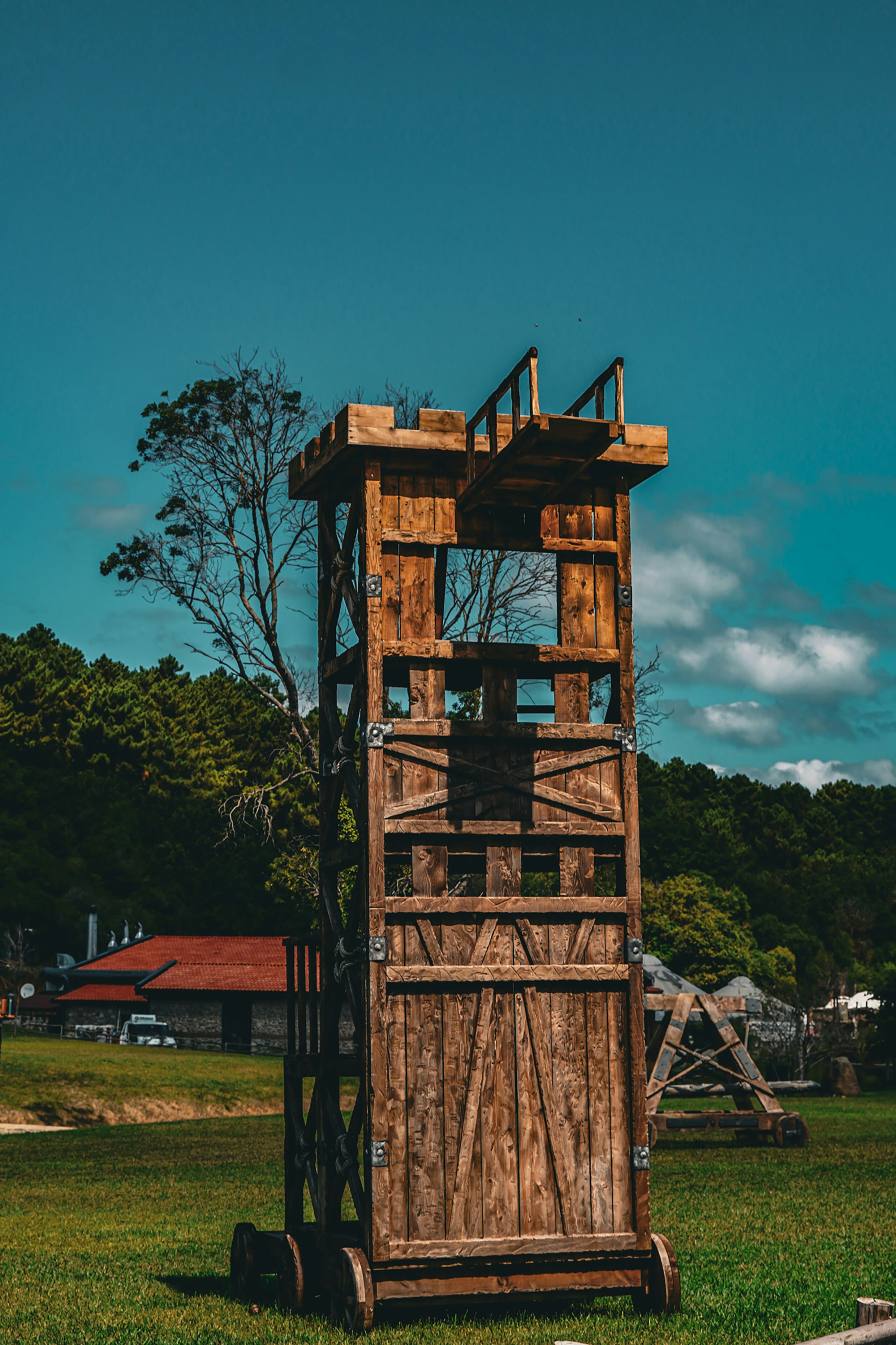Weathered Timber Watchtower Reaching Toward a Cerulean Sky