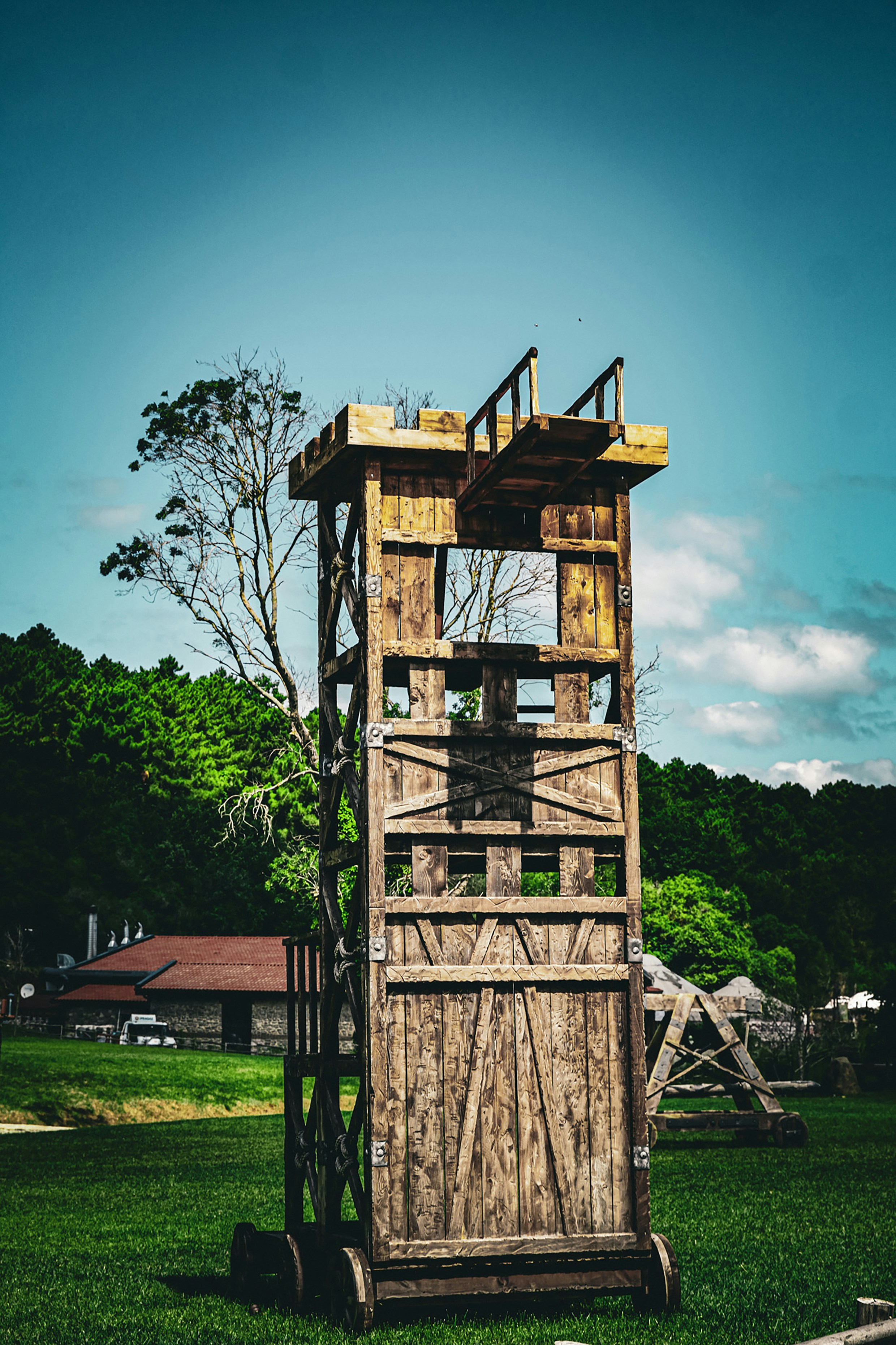 Weathered Watchtower: A Wooden Sentinel against a Clear Sky