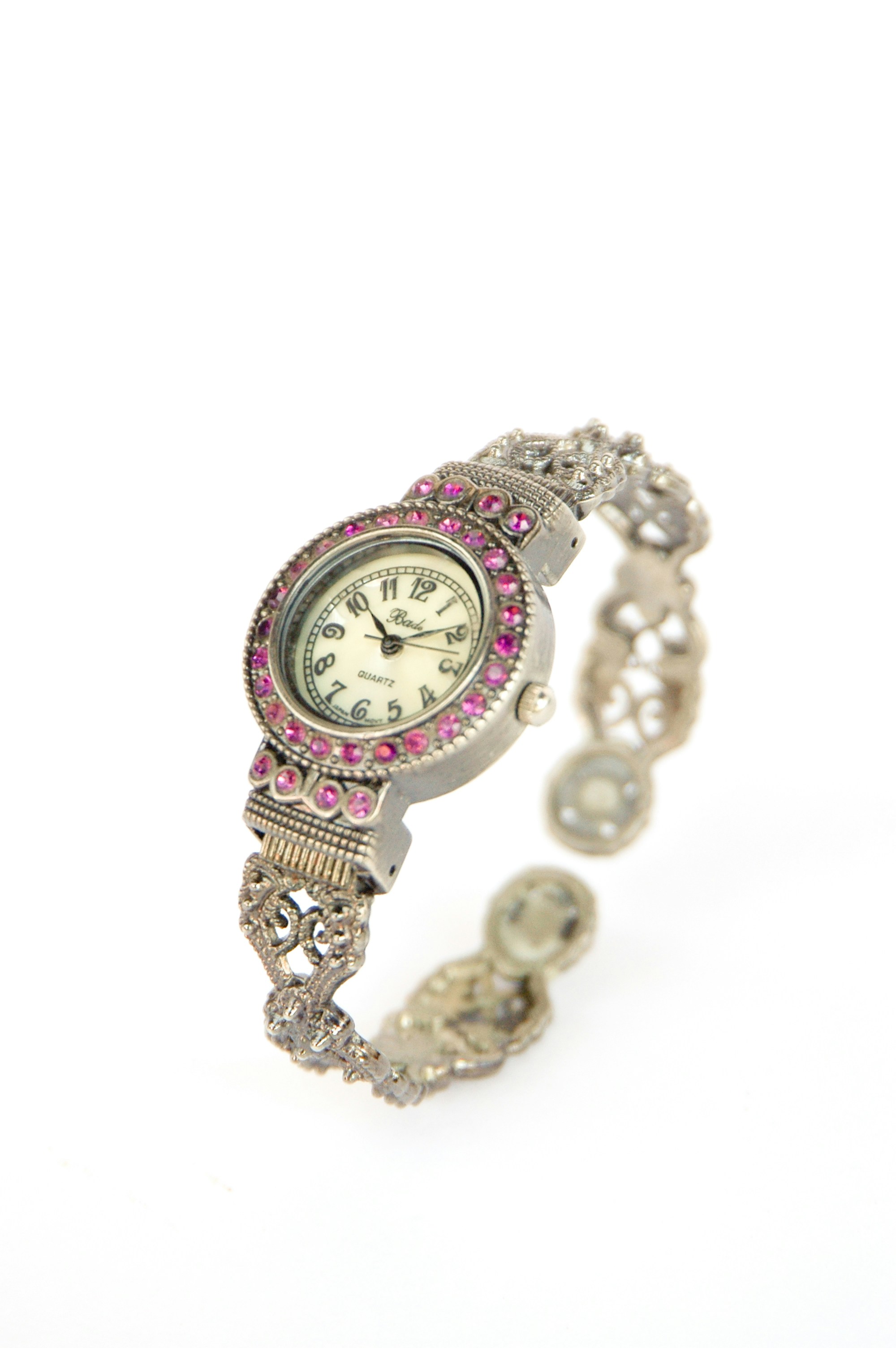 Pink-Gemmed Vermeil Filigree Wristwatch on White Backdrop