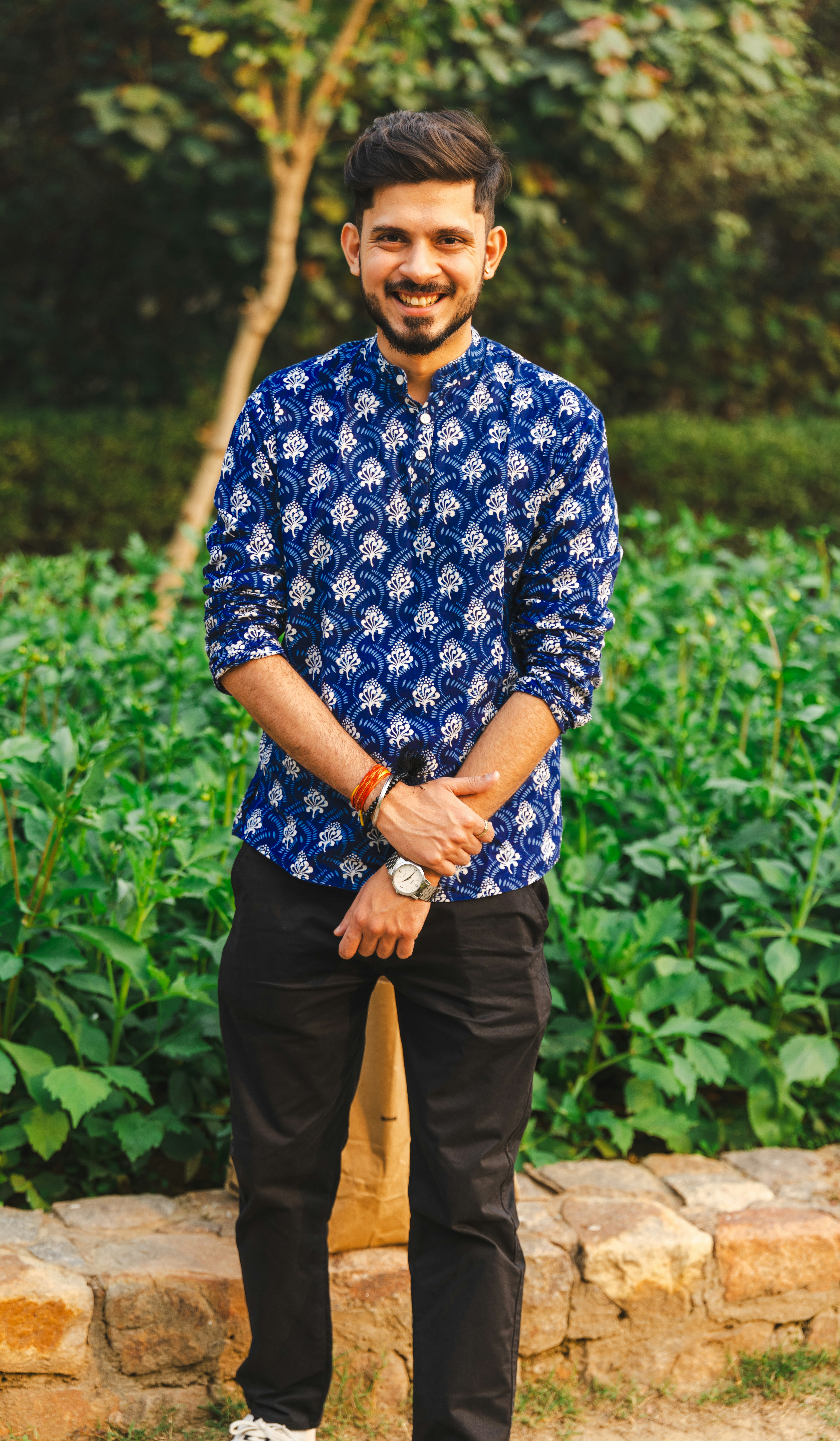 Verdant Elegance in a Blue Patterned Shirt