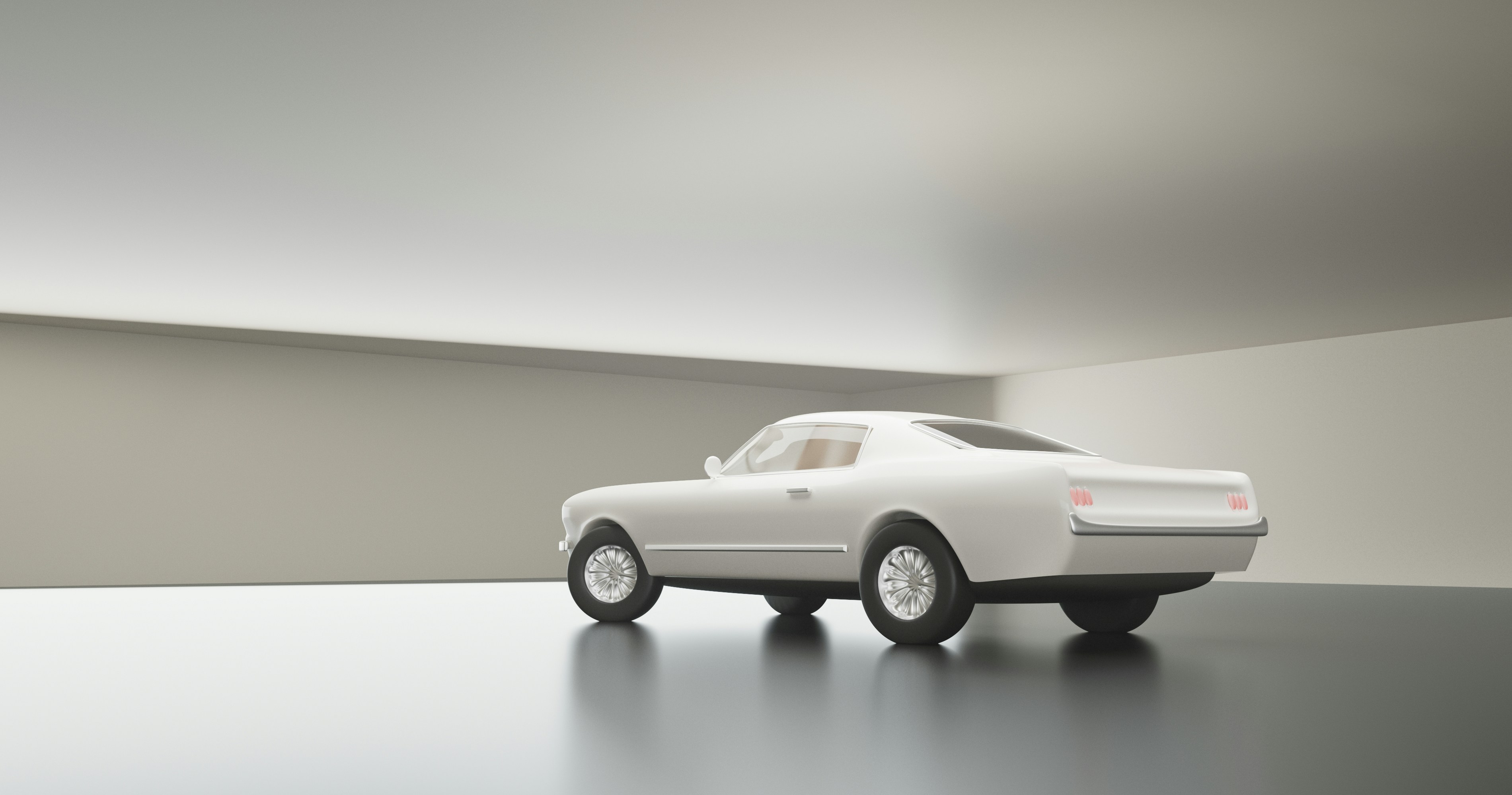 A white car driving down a road next to a white wall photo – Free ...