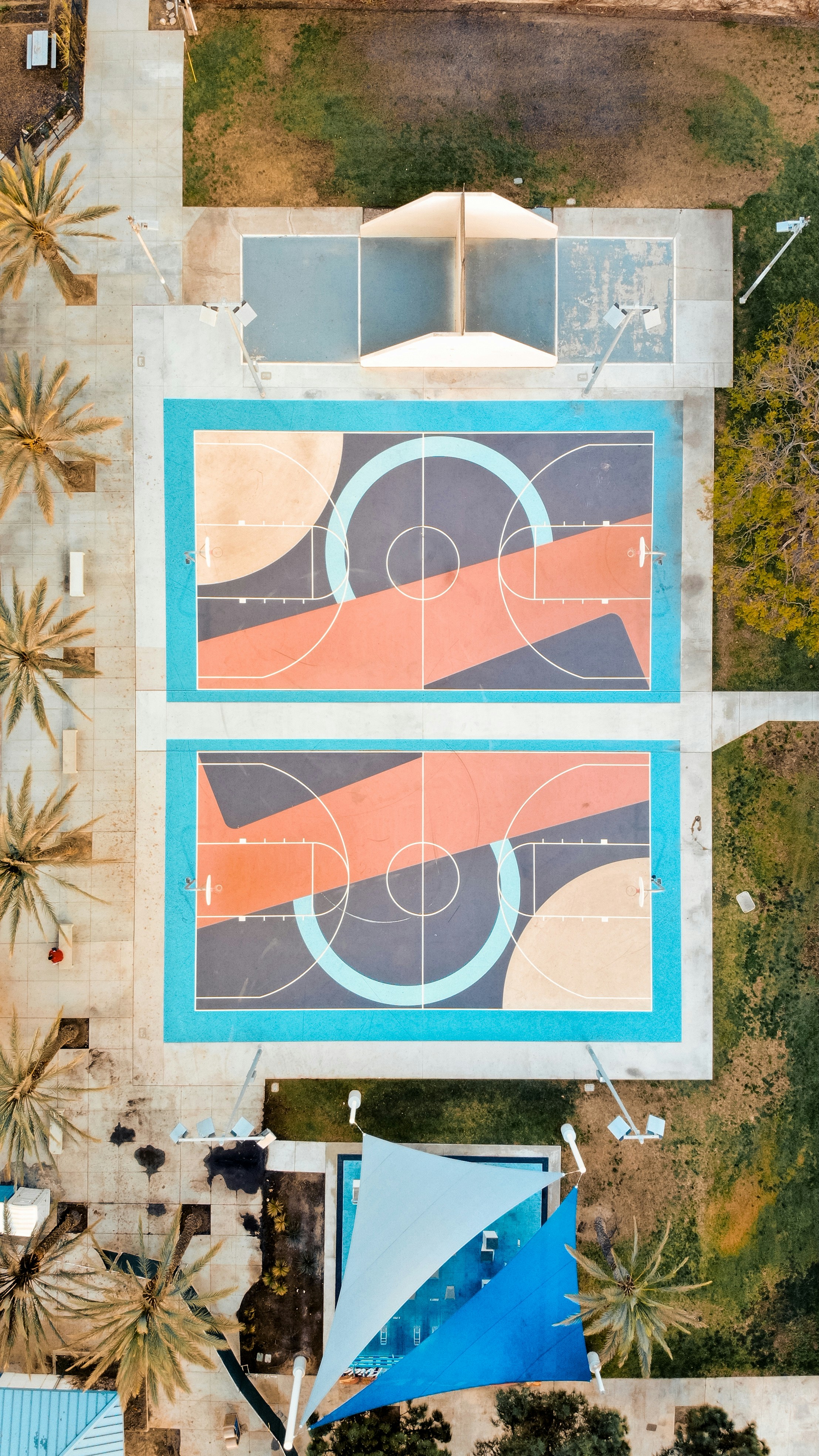 Twin Courts, One Sky: An Aerial Study of Colorful Geometric Hoops