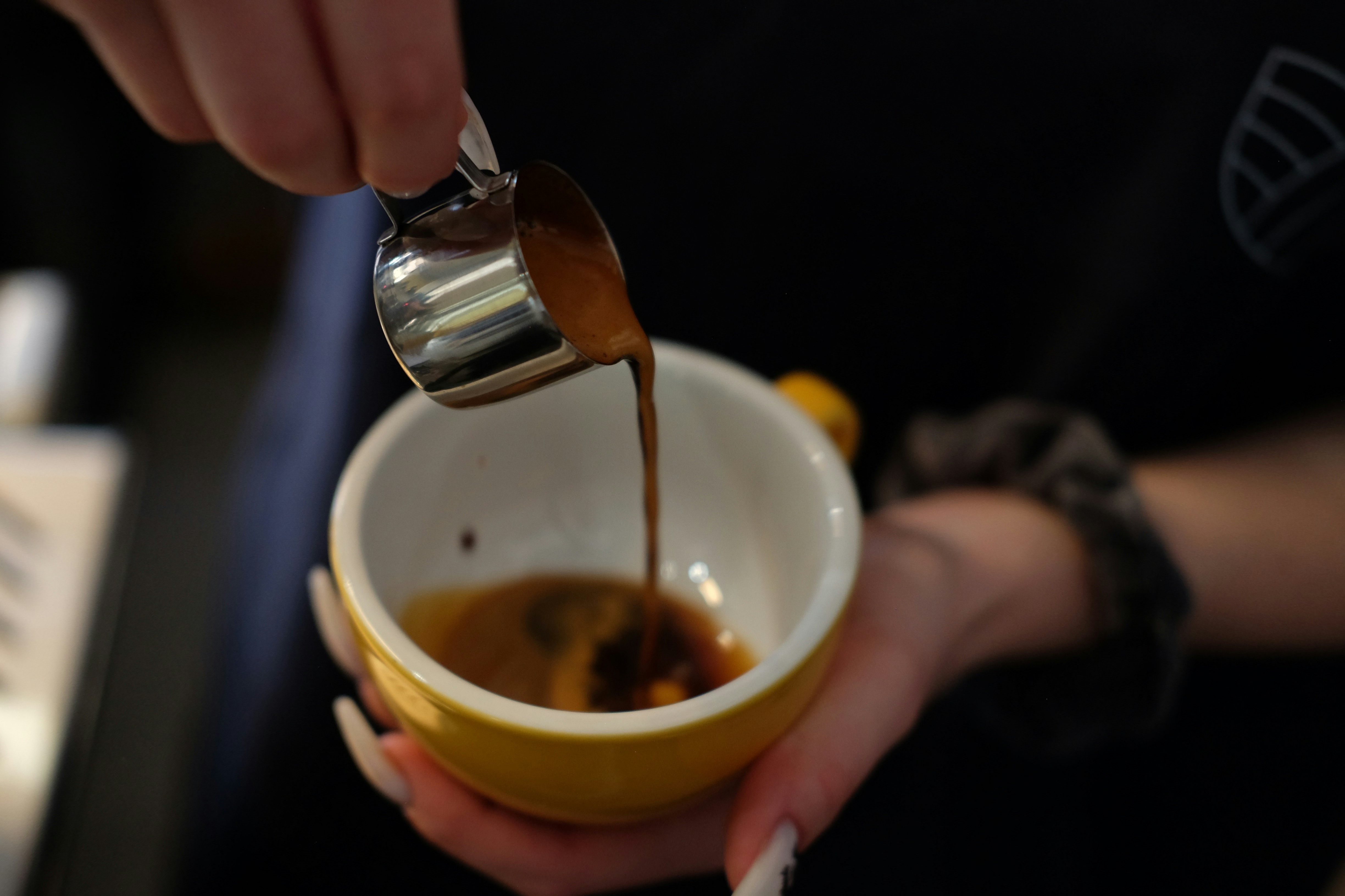 Crema Cascade into a Sunlit Yellow Cup