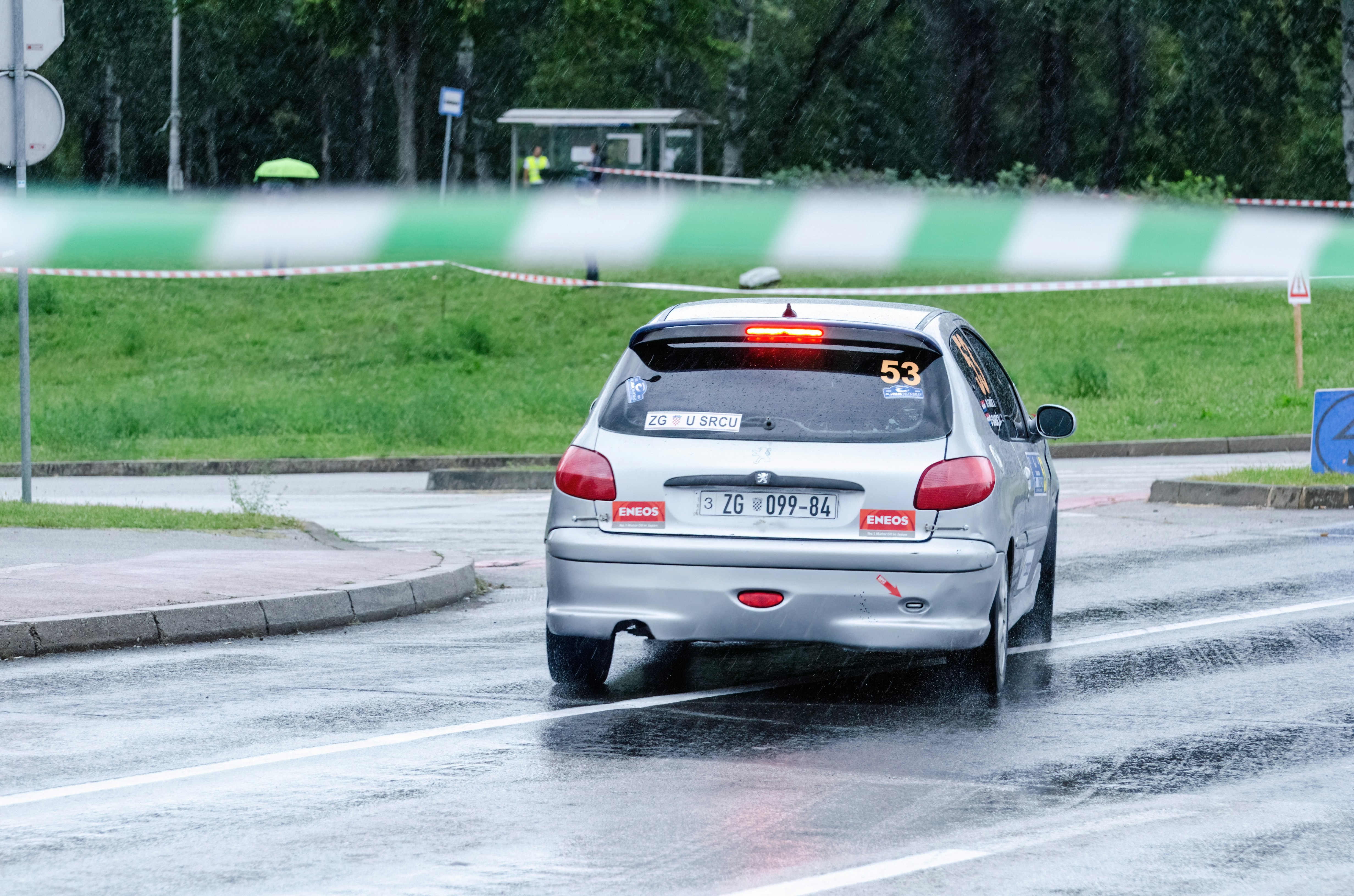 A car driving down a wet road in the rain photo – Free Zagrebački ...