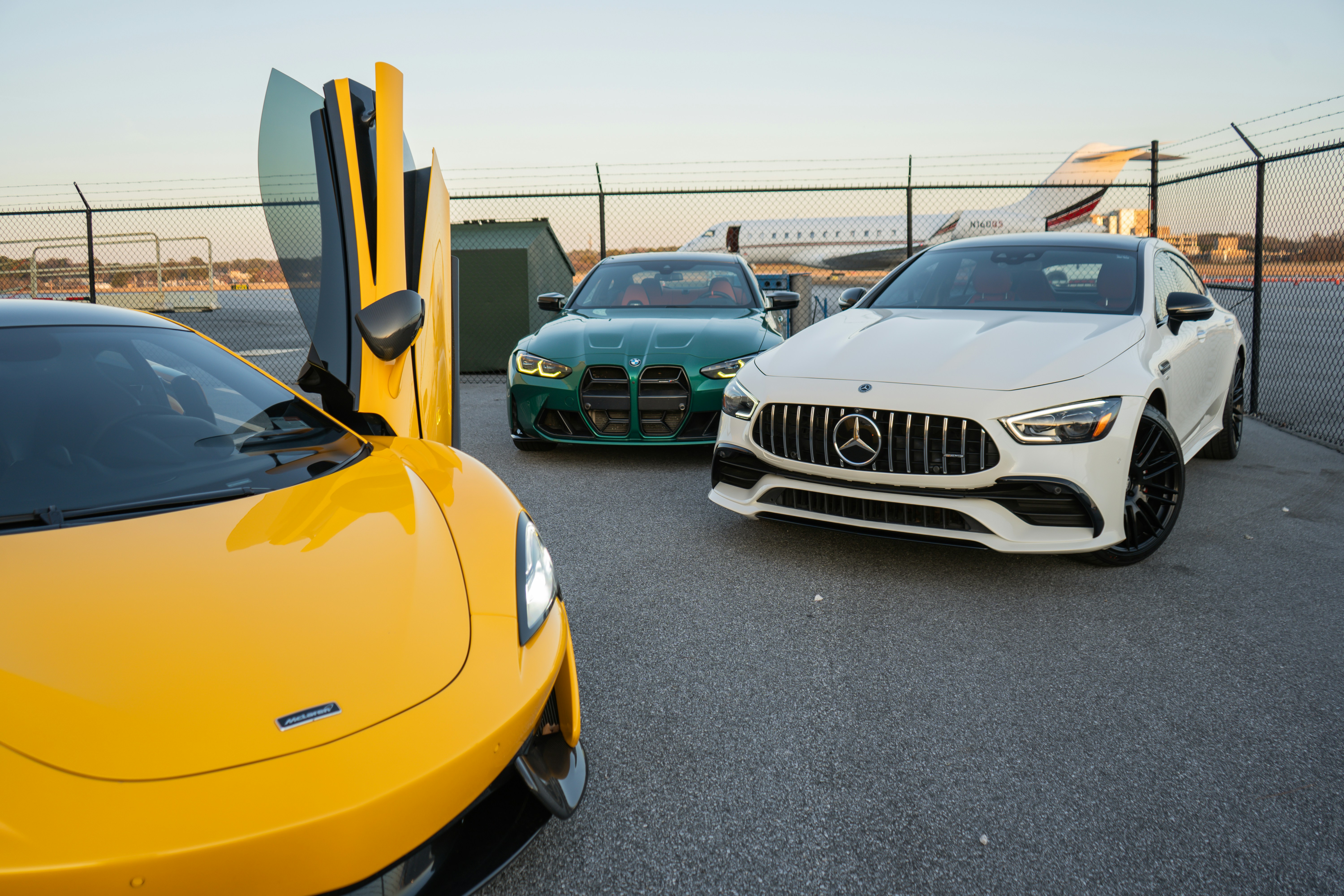 A group of cars parked next to each other photo – Free Car Image on ...
