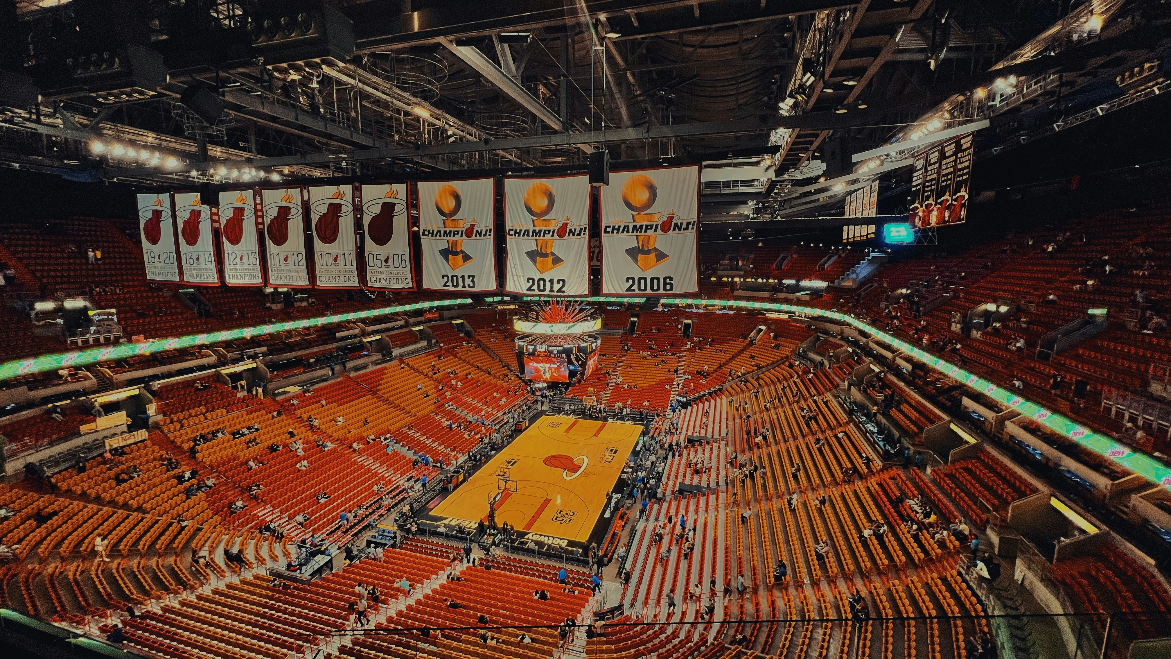 A large basketball court with a lot of seats photo – Free Human Image ...