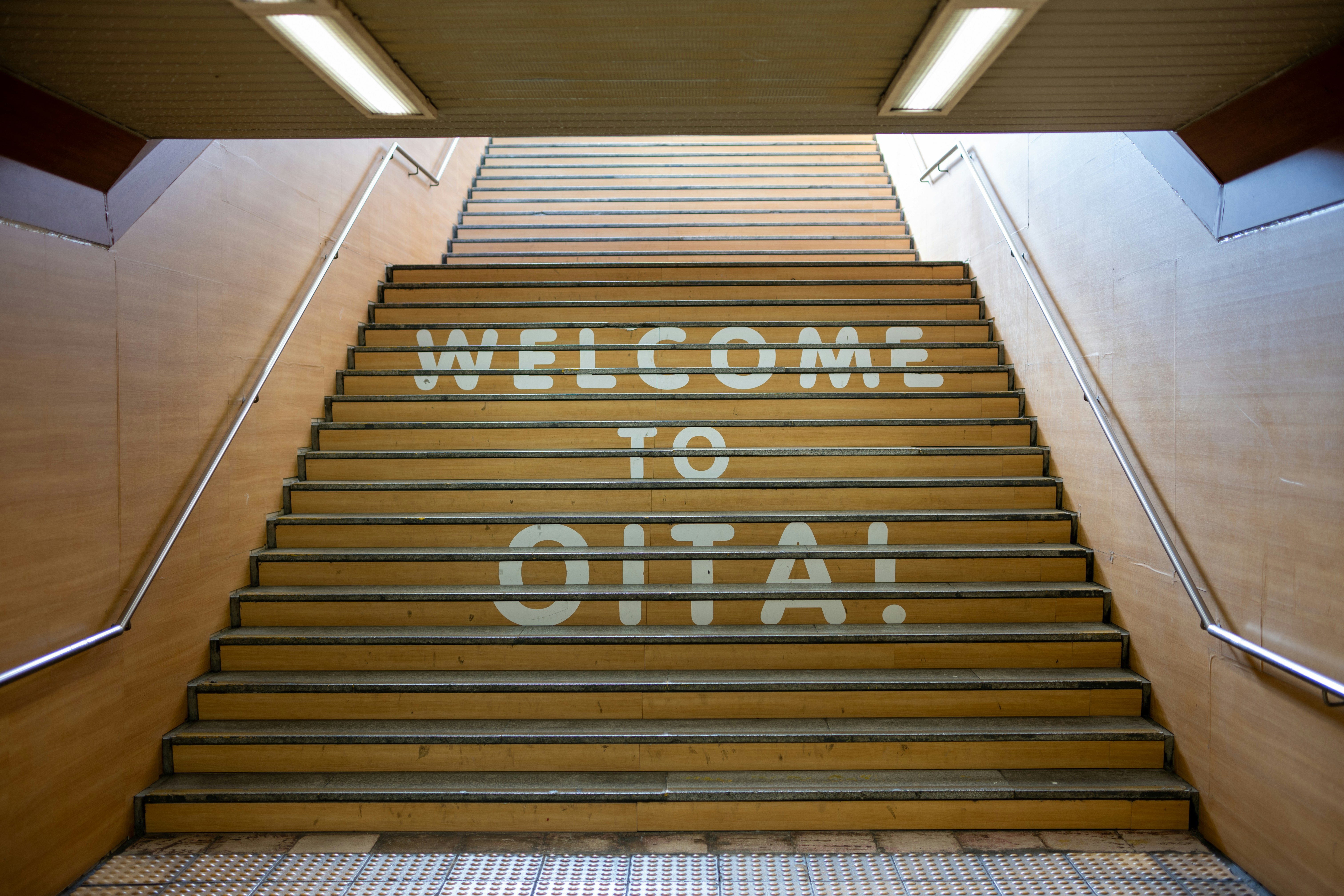 A set of stairs with a welcome sign painted on them photo – Free House ...