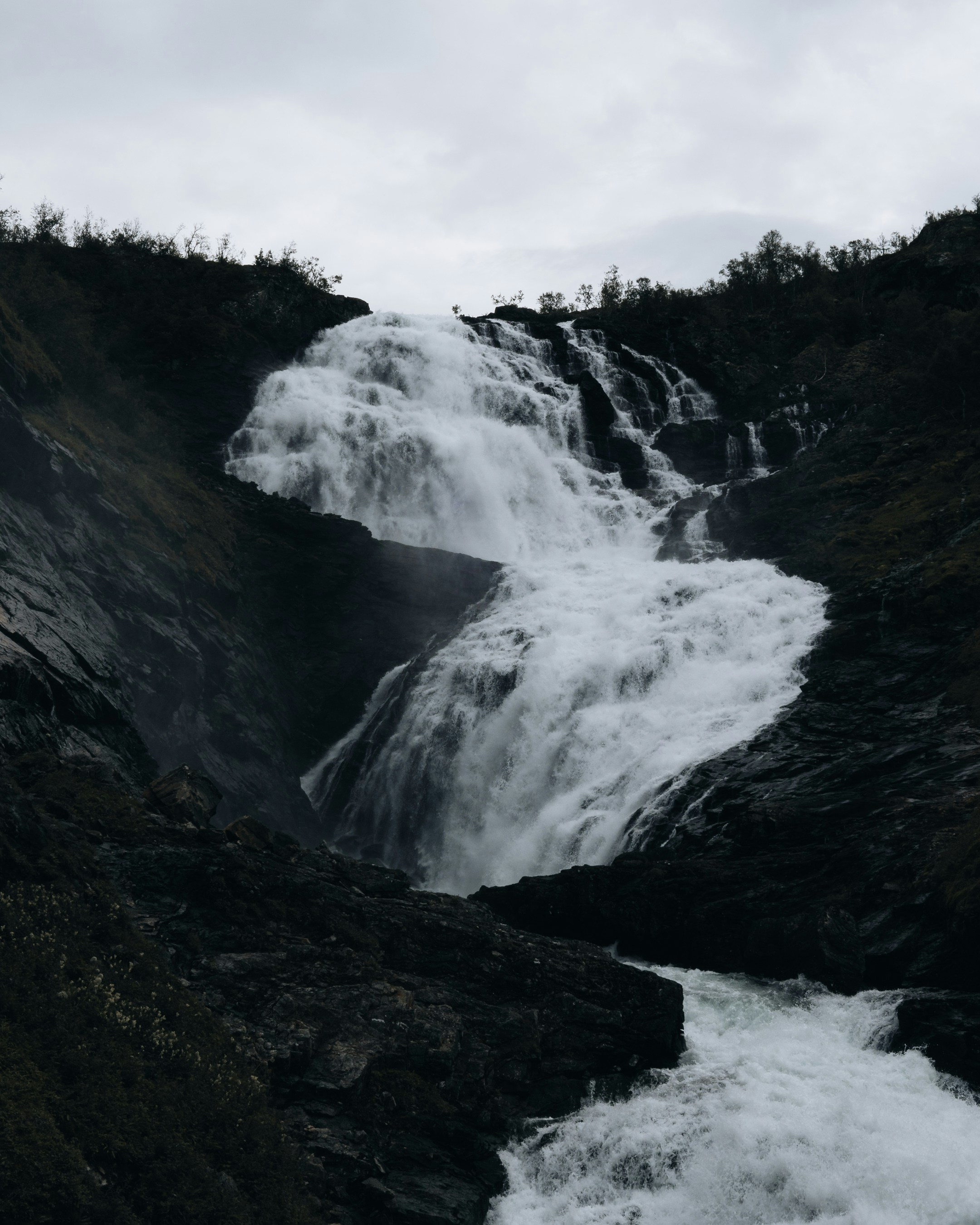 Midnight Cascade: White Torrent in a Shadowed Gorge