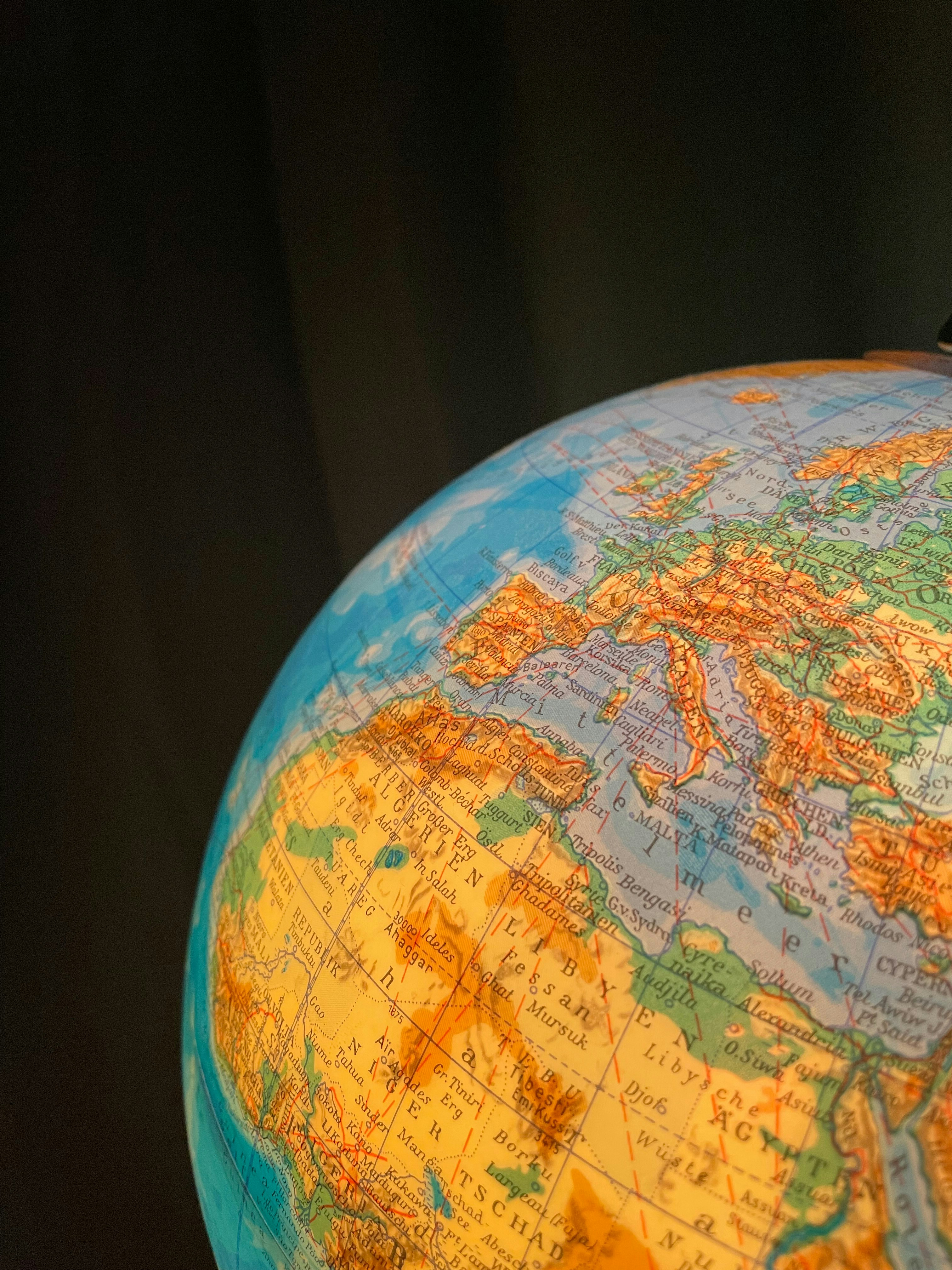 A close up of a globe with a black background photo – Free Earth Image ...