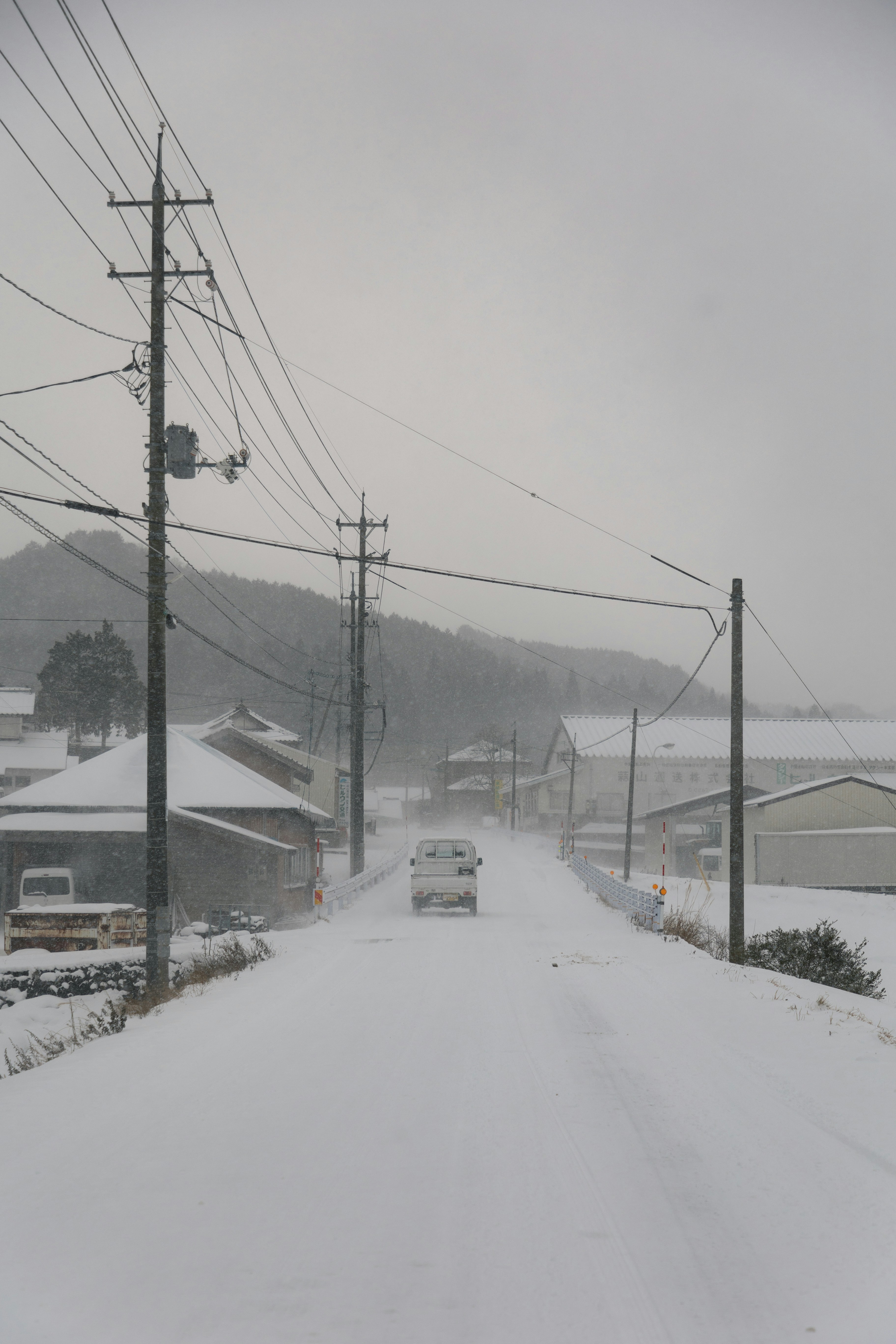 Snowbound Street Keeps Its Quiet March