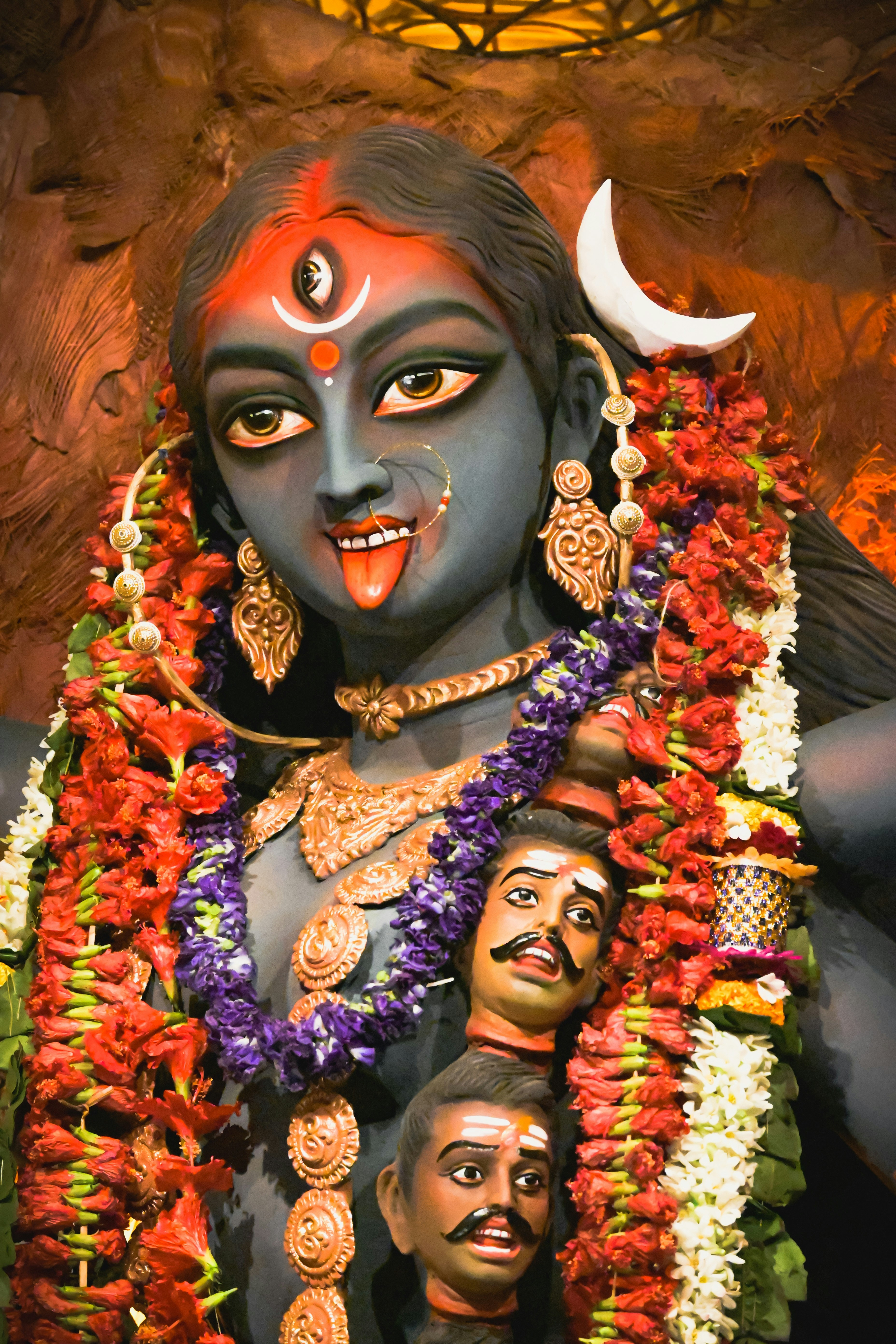 A statue of a hindu god with many faces photo – Free Flower Image on ...