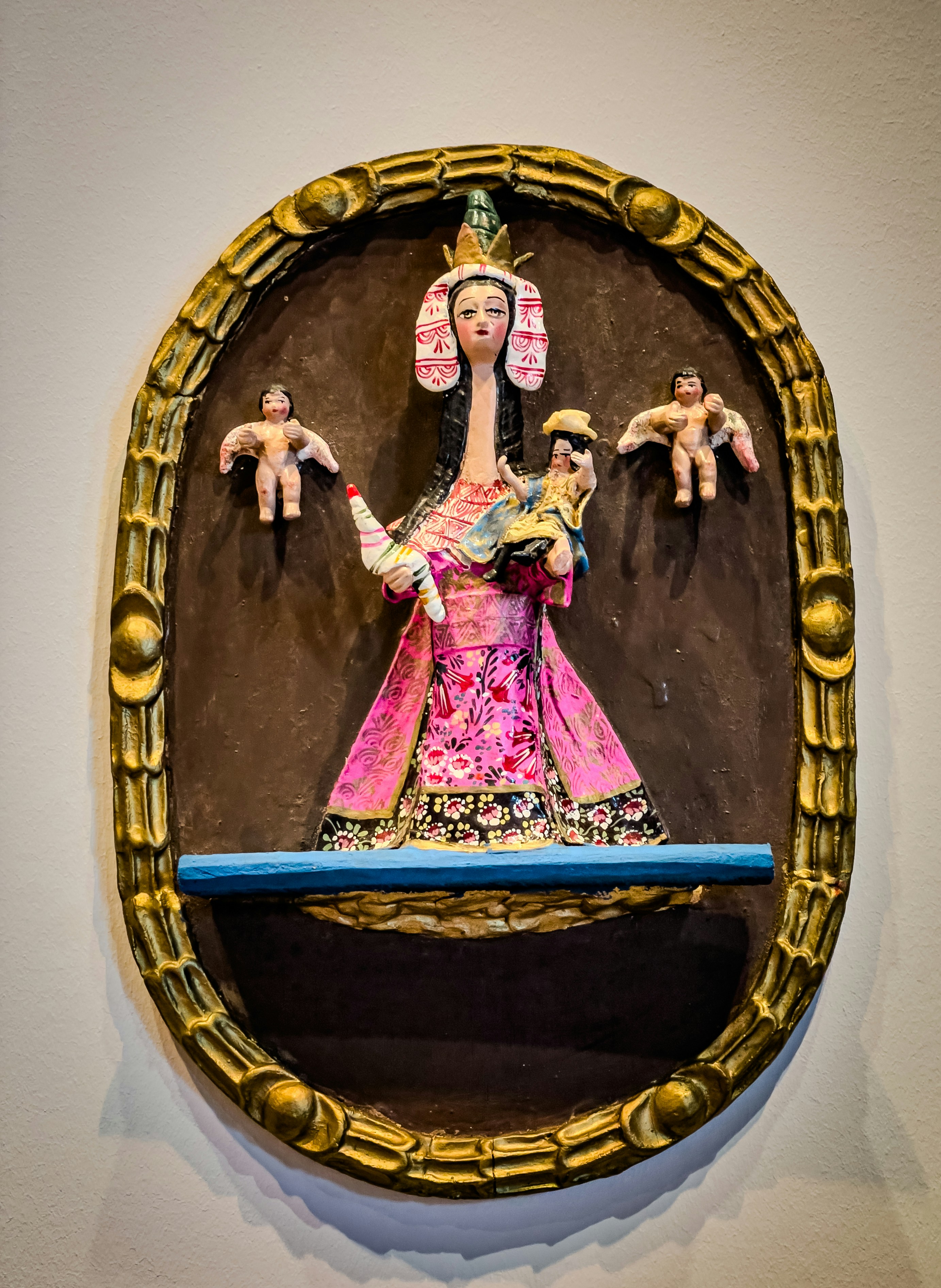 Gilded Oval Matriarch: Pink-Gowned Figure Cradling a Child