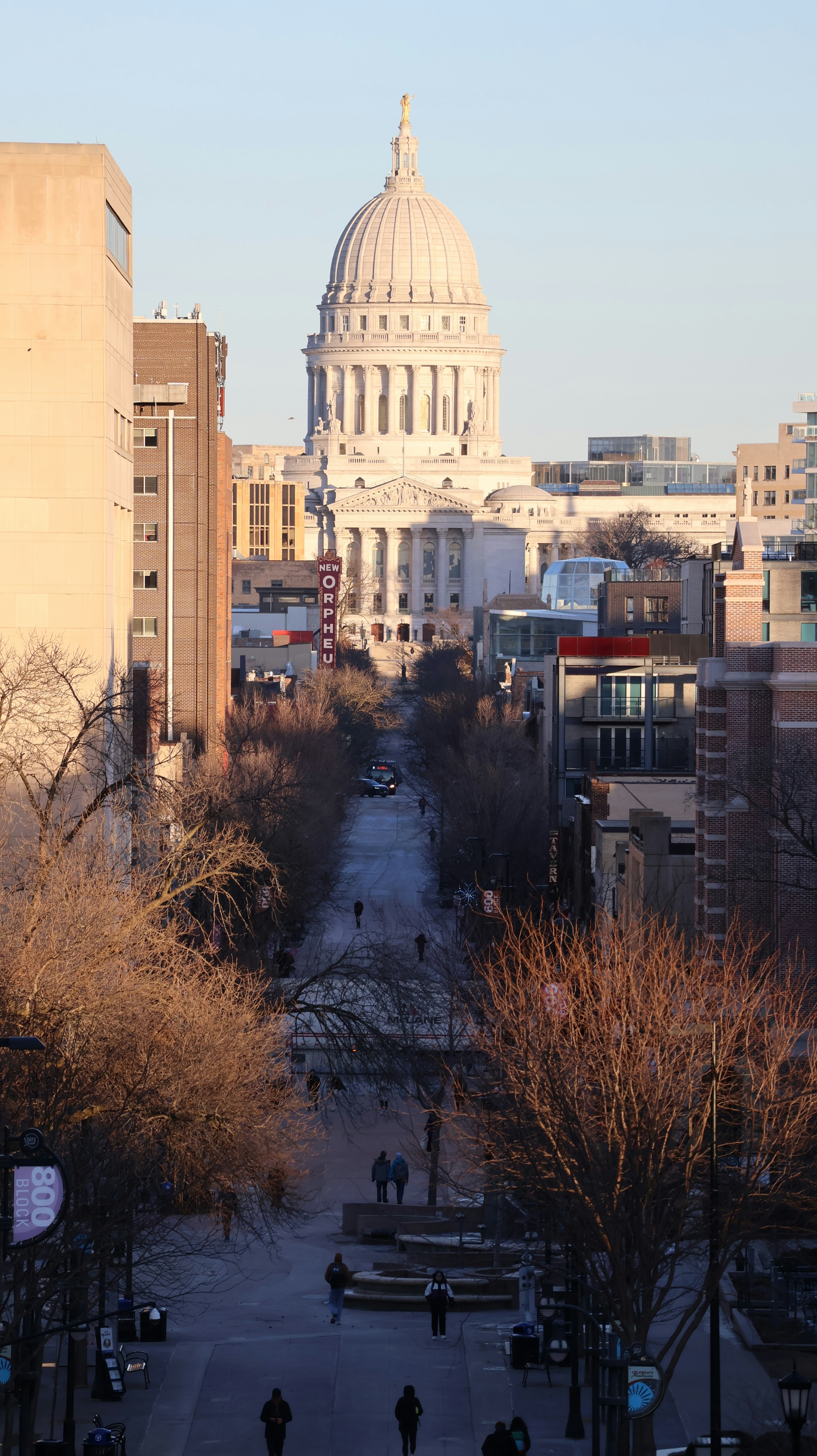 A view of a city street with a dome in the backgroundKalyan Ram Mantrala