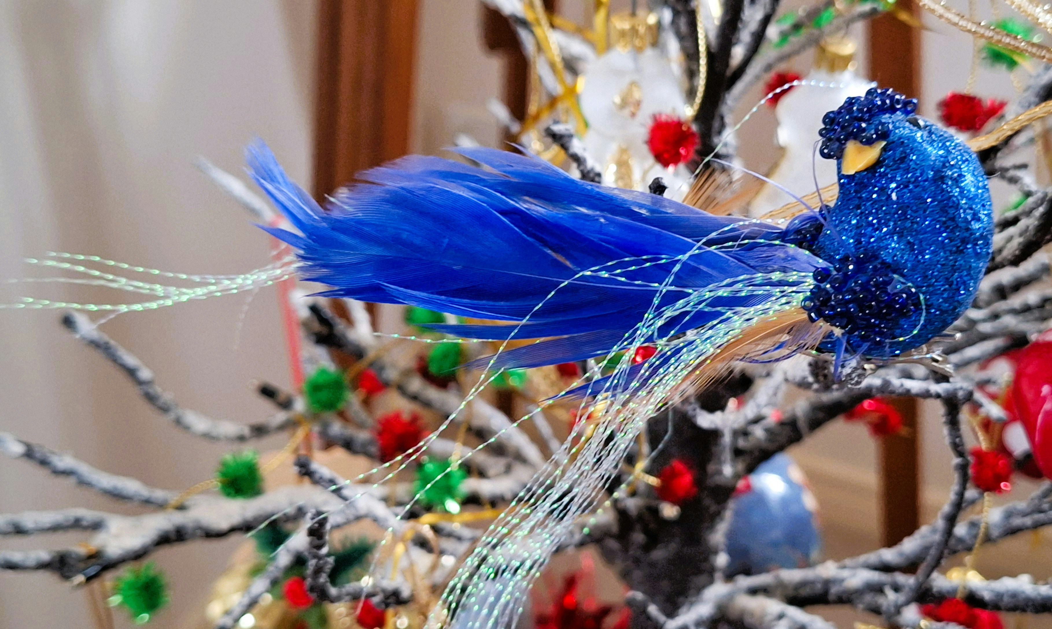 Whimsical Elegance: The Glittering Blue Bird