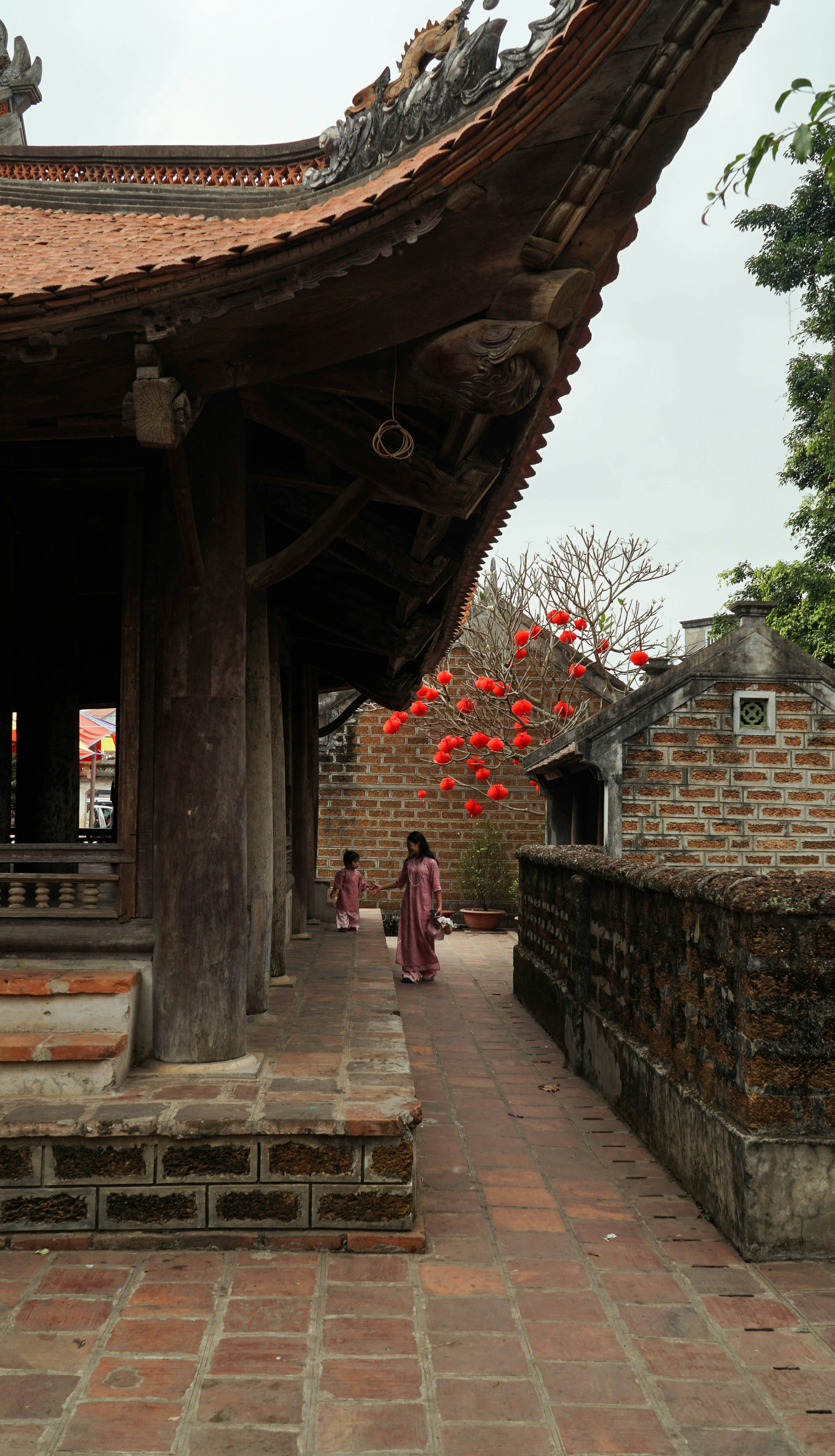 Whispering Eaves and Red Lanterns: A Temple Courtyard Walk