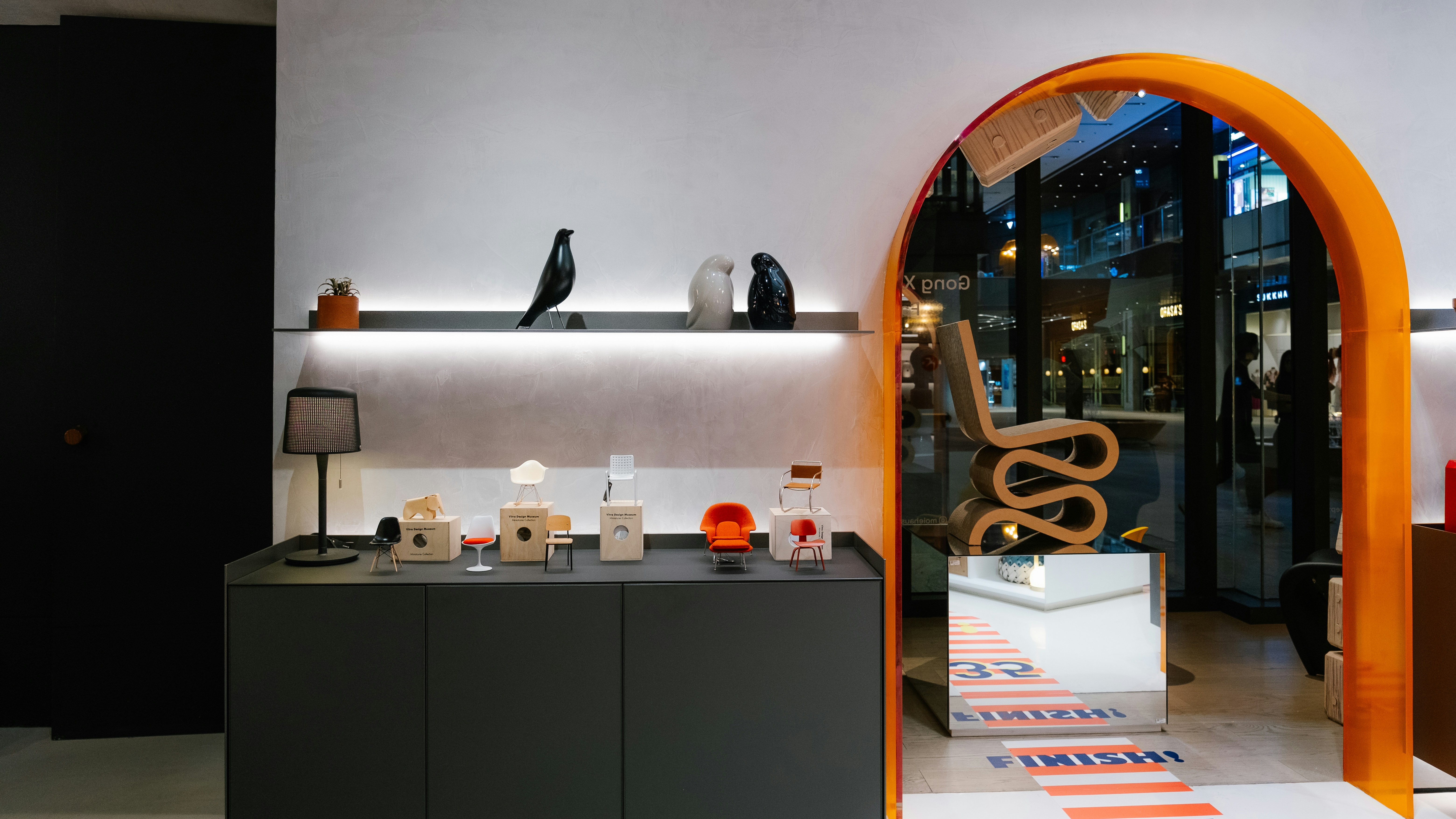 A store front with a large orange arch photo – Free Jakarta Image on ...