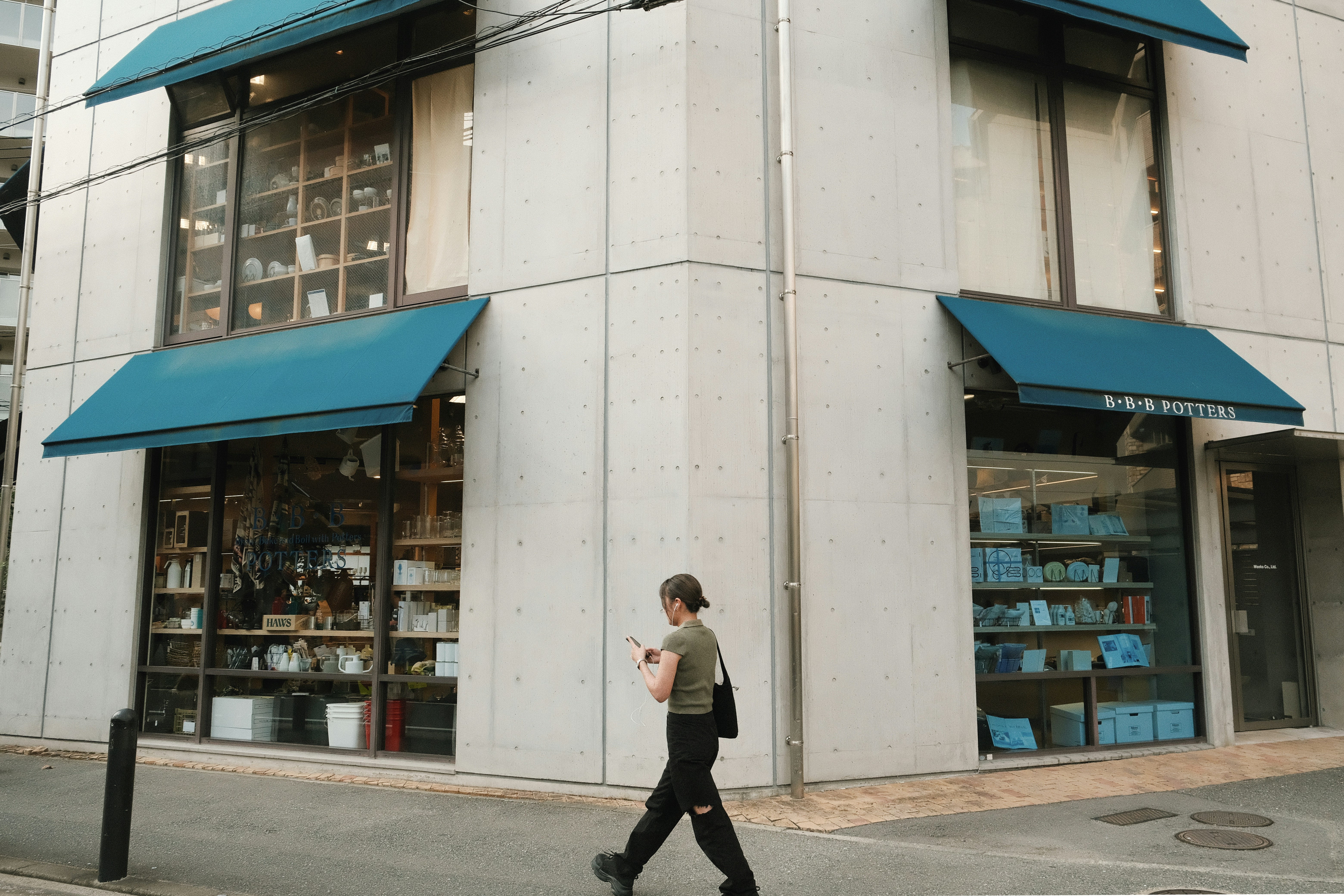 Concrete Calm: A Walk Past the Potter's Window