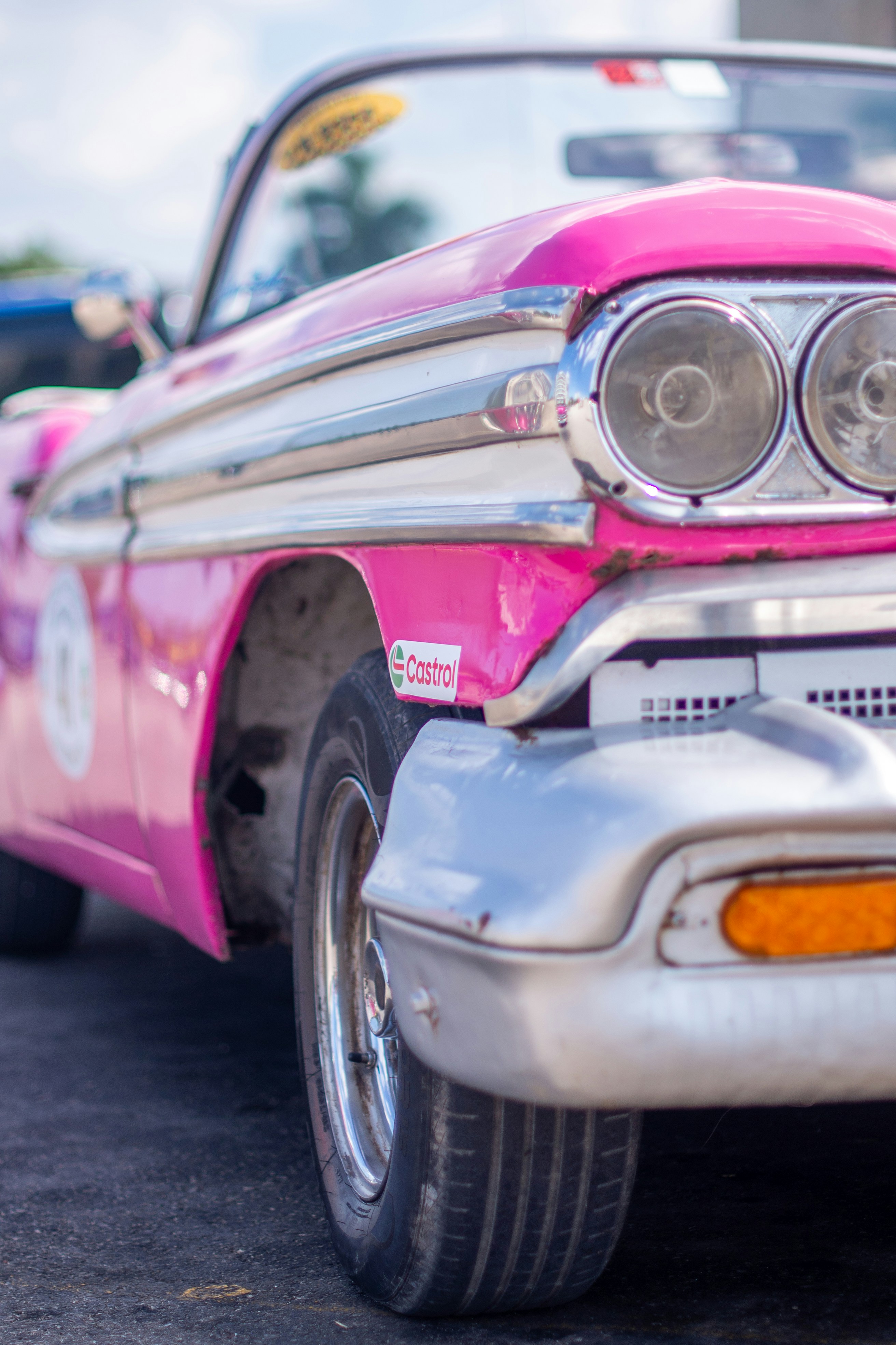 Gleaming Pink Classic: chrome lines and retro soul bathed in afternoon light