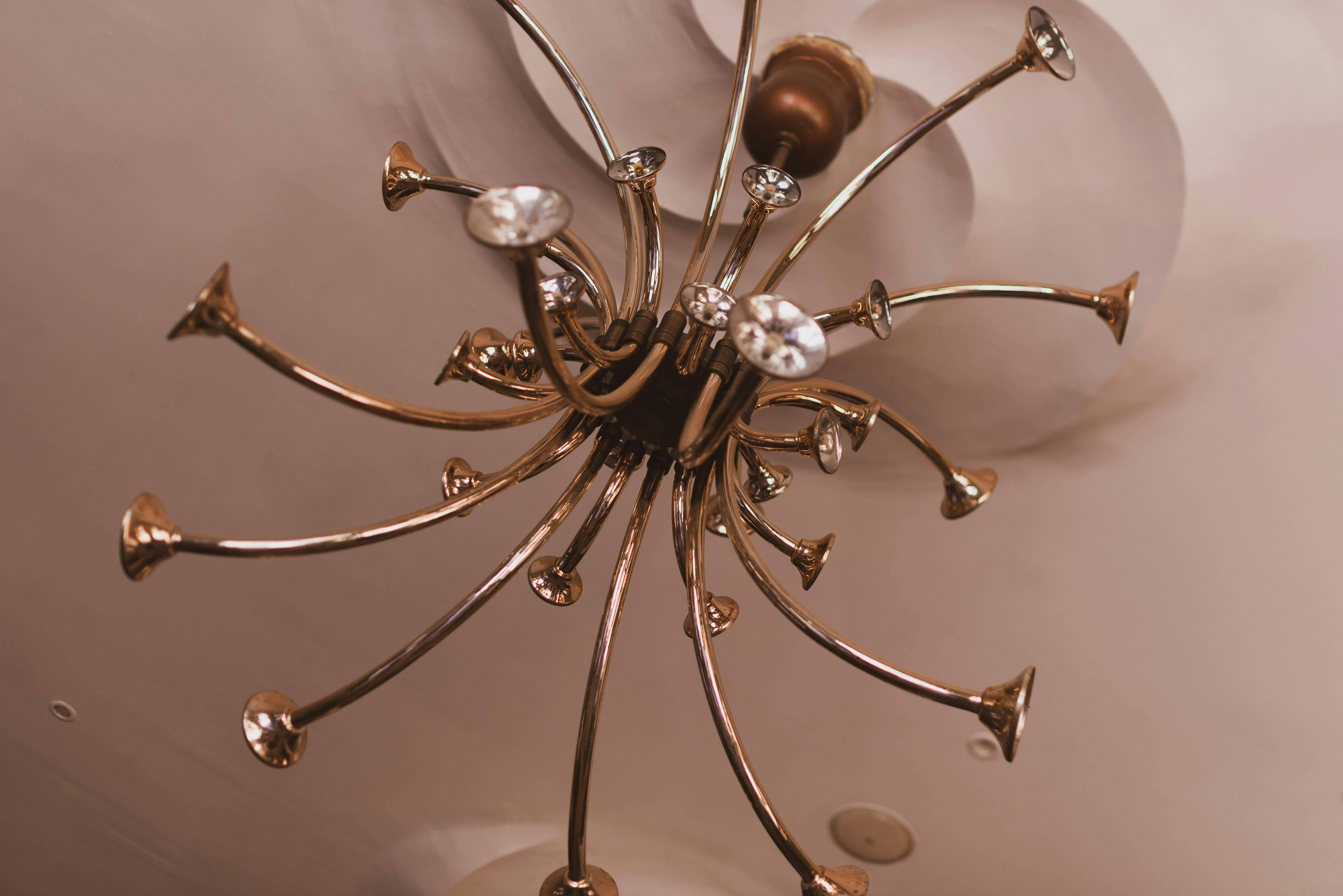 Sepia Starburst: Close-up of a Crystal-Chrome Chandelier