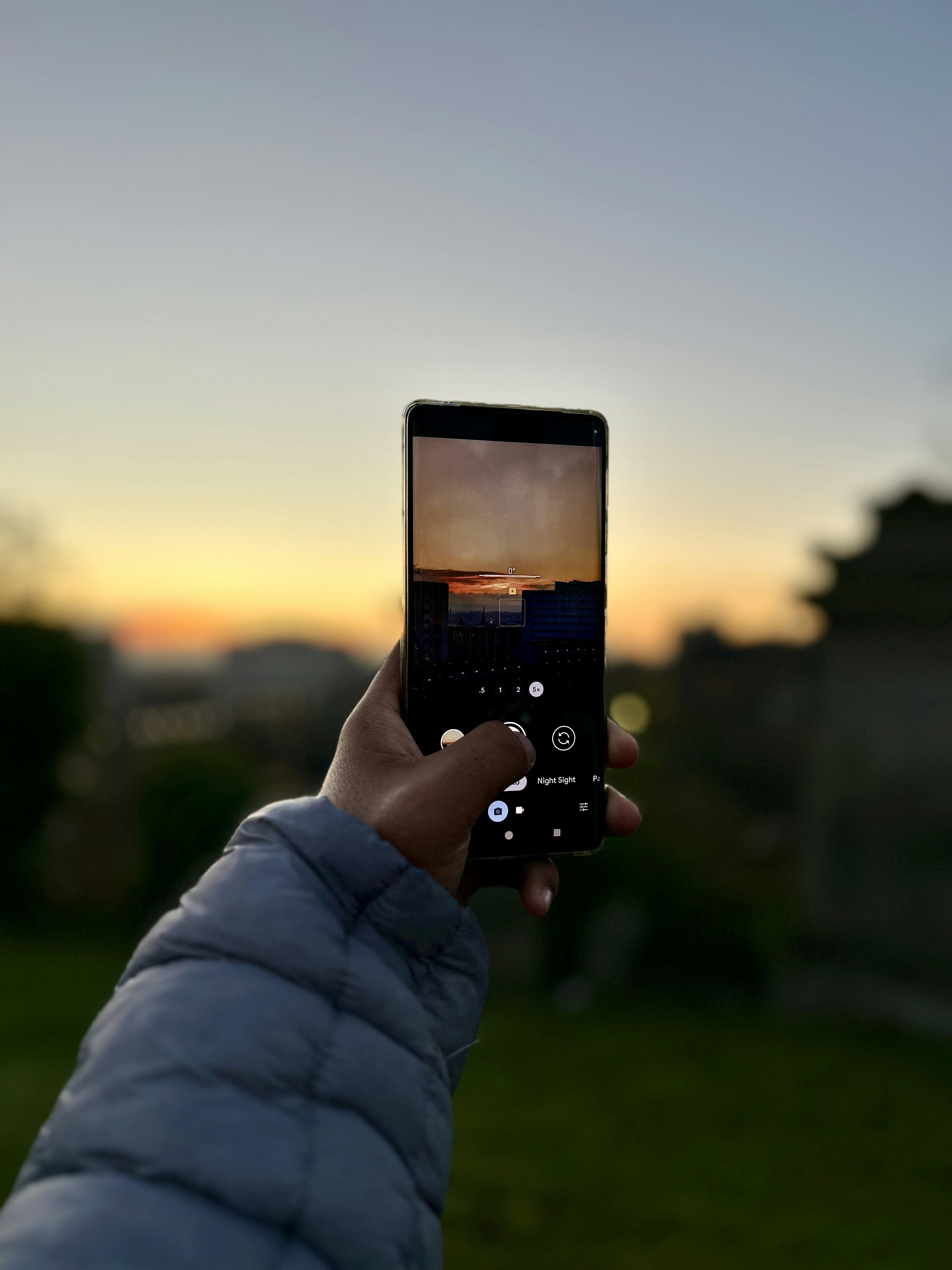 A person taking a picture with a cell phone photo – Free Photo Image on ...