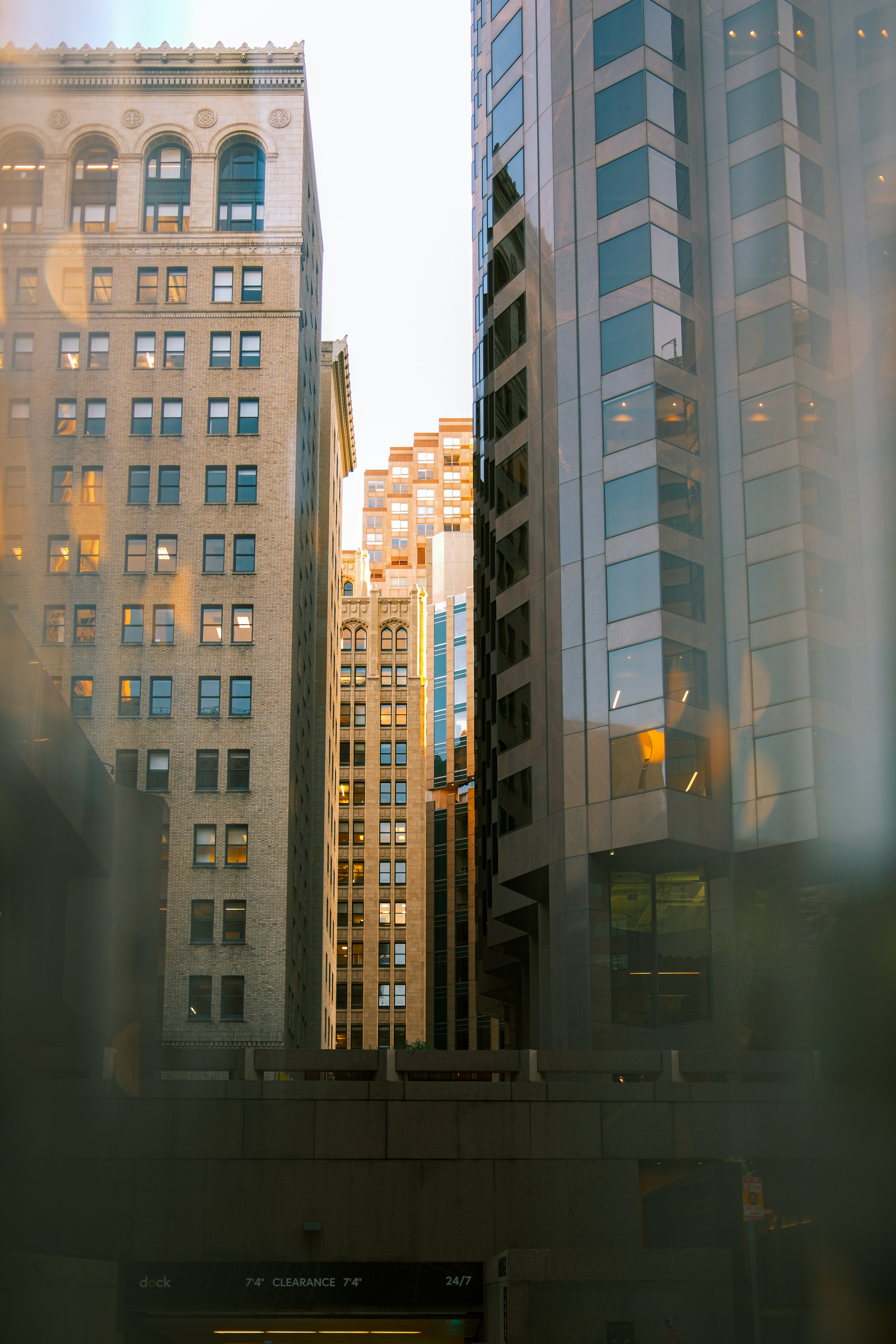 A view of some very tall buildings in a city photo – Free Wallpaper ...