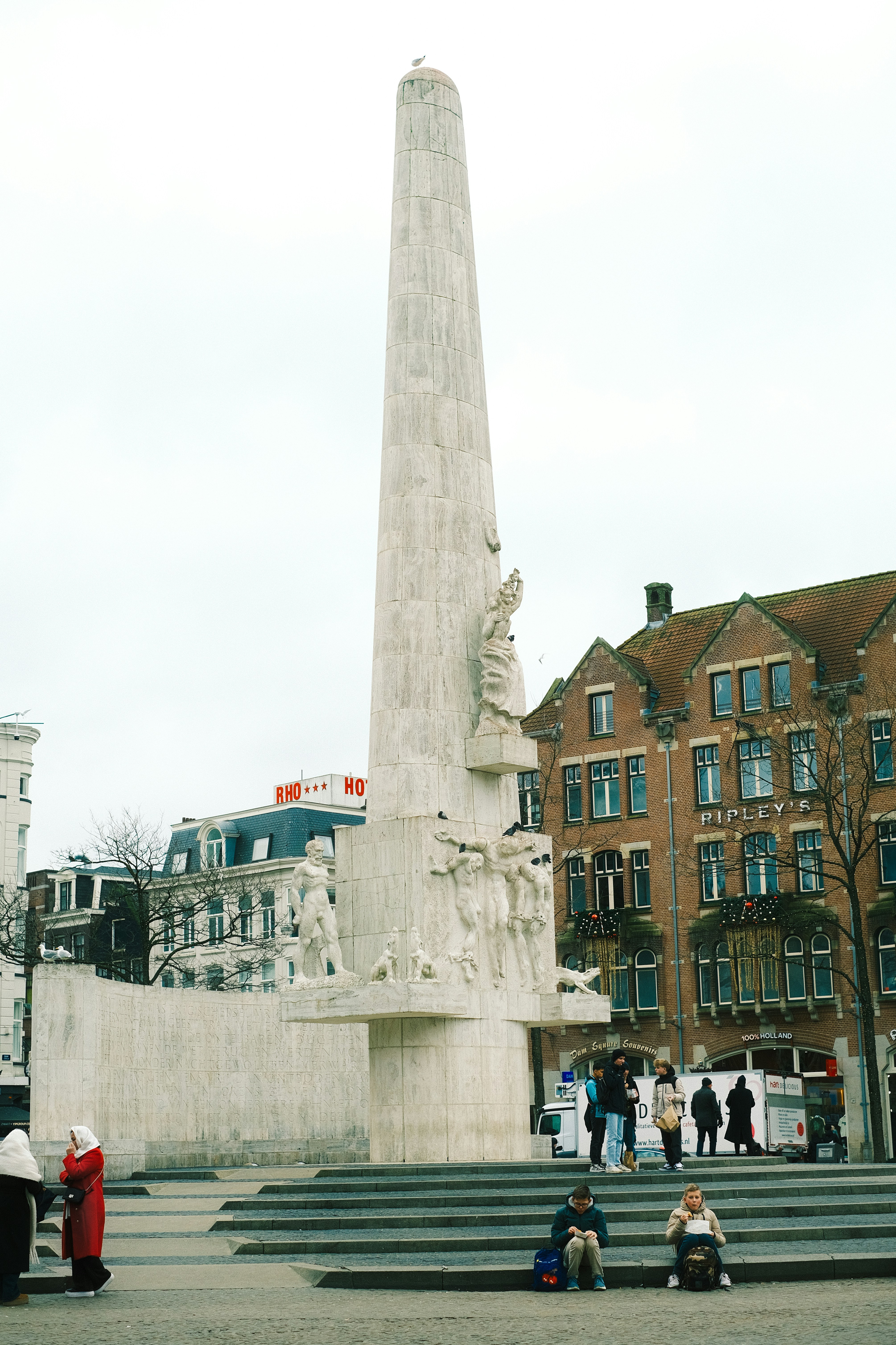 Pillar of Time Over a Bustling European Square