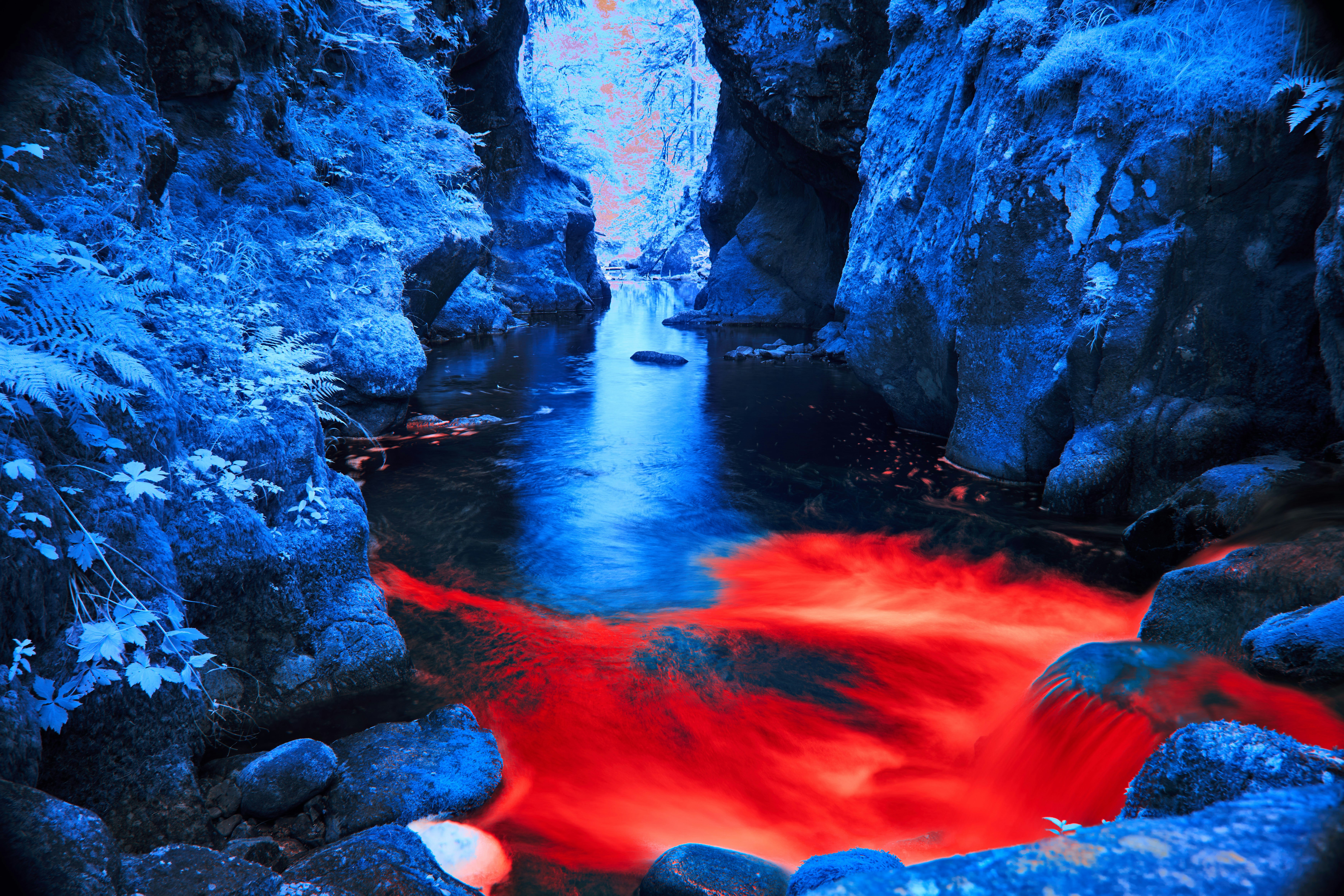 Crimson Currents in a Sapphire Gorge