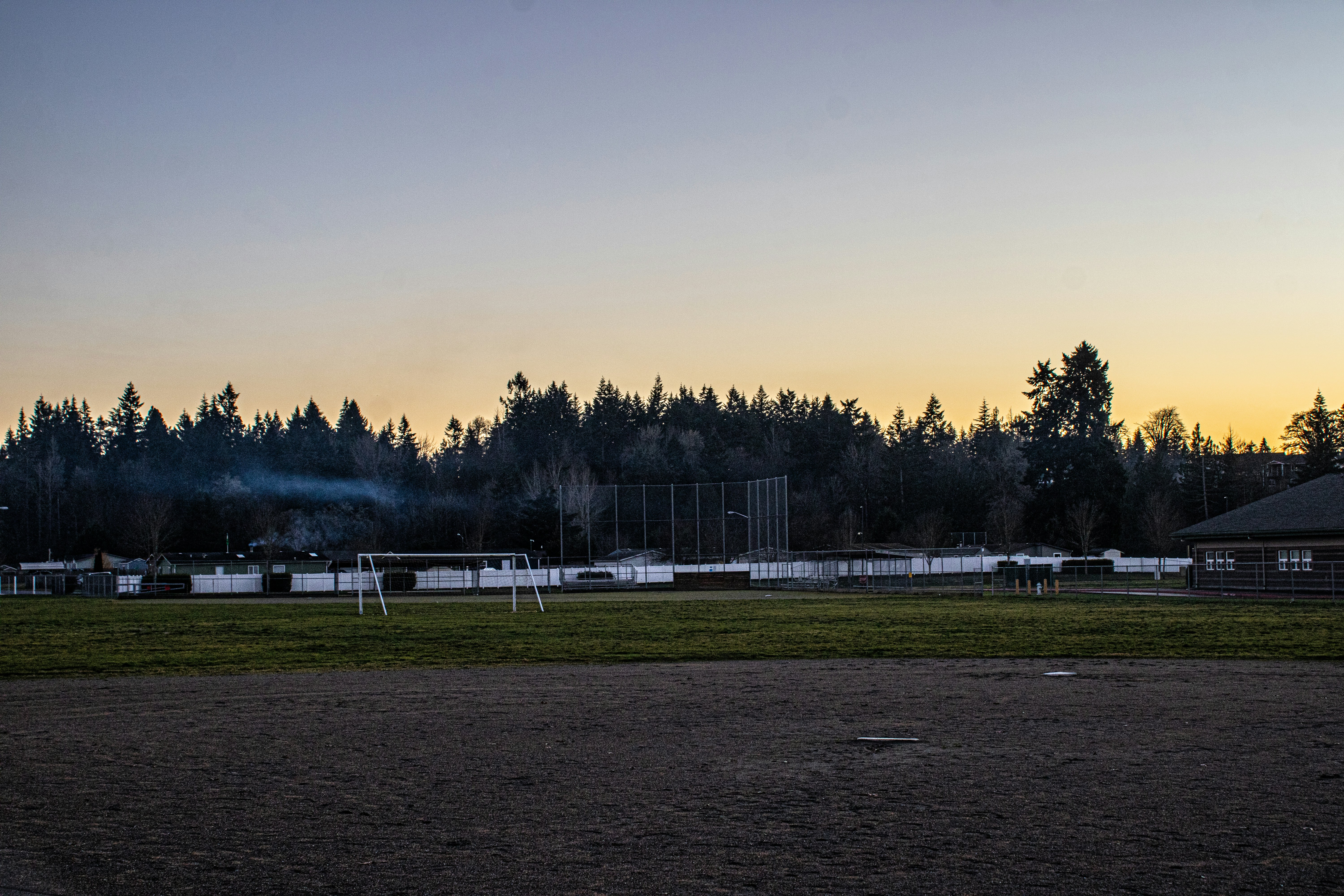 A baseball field with trees in the background photo – Free Yelm Image ...