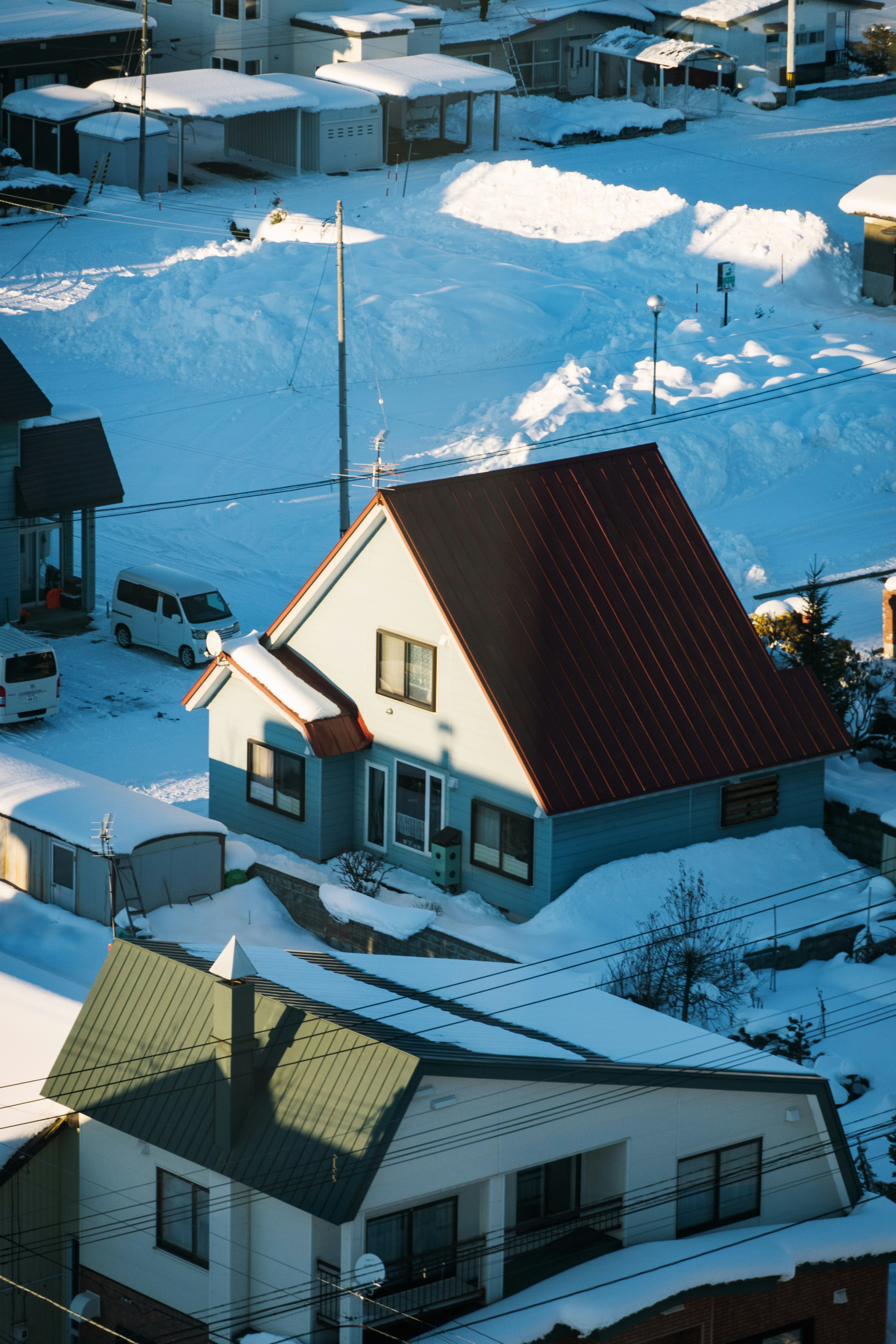A snow covered area with houses and a lot of snow photo – Free Hokkaido ...