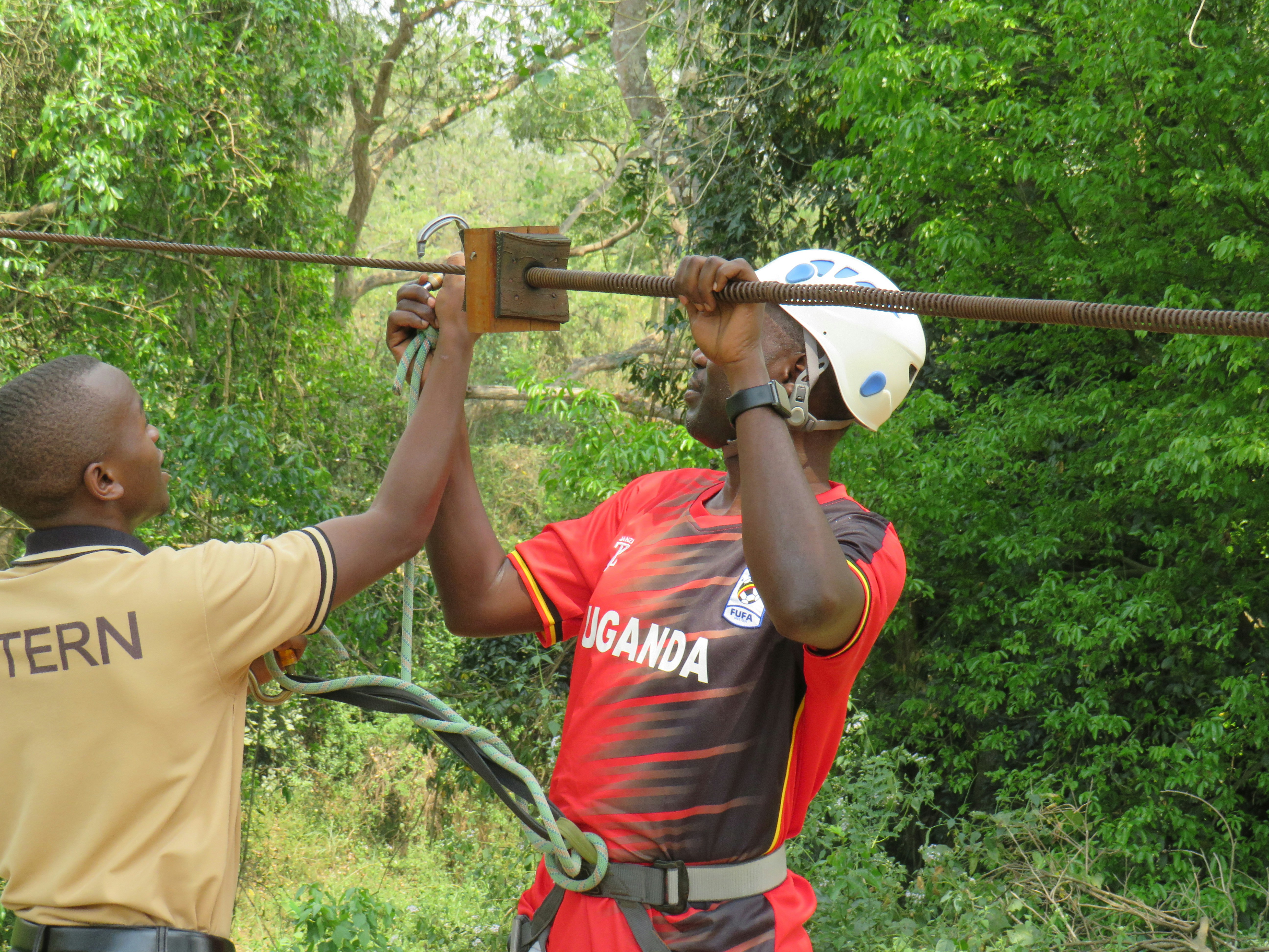 A couple of men standing next to each other photo – Free Sambiya river ...