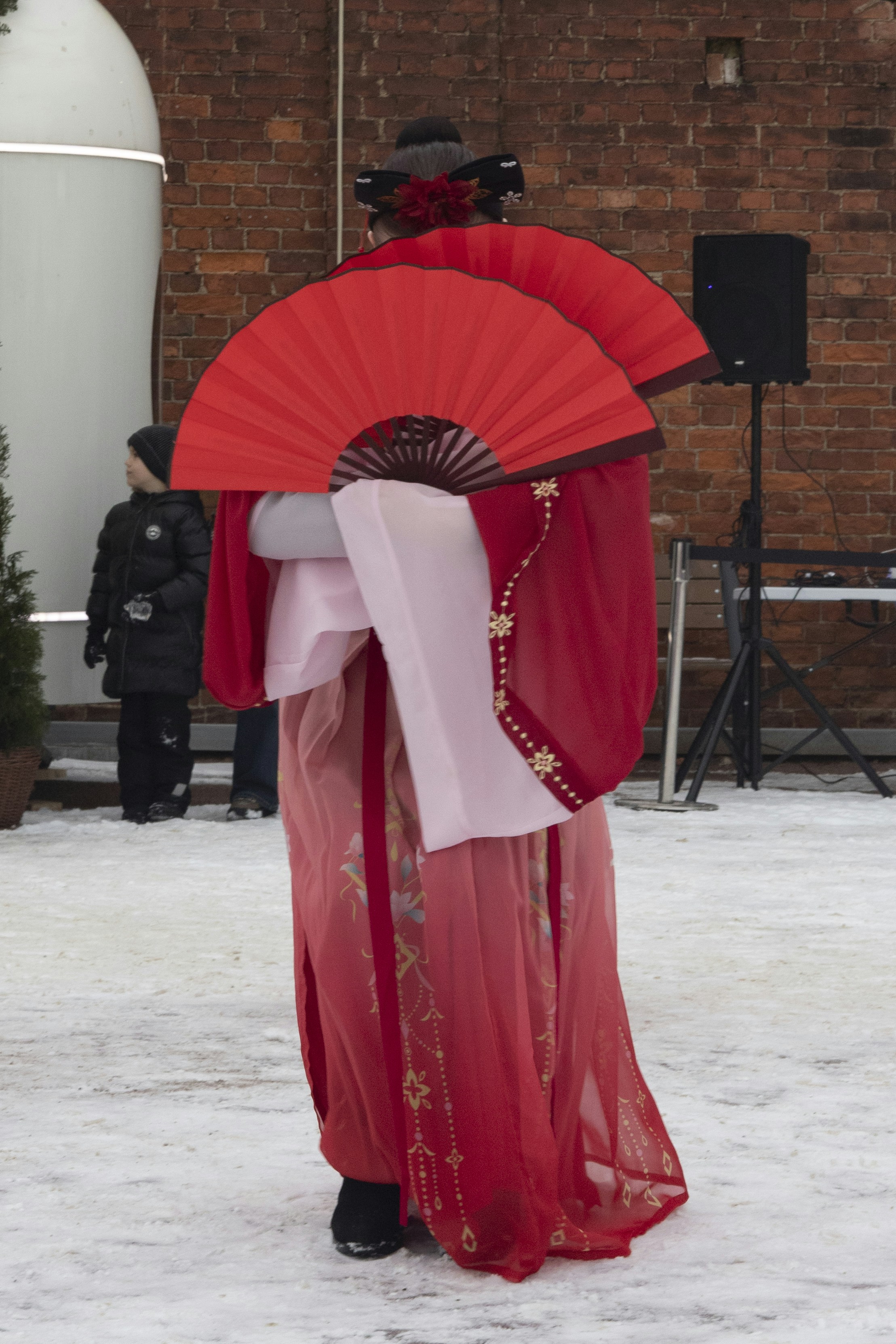 A woman in a red kimono holding a red fan photo – Free Woman Image on ...