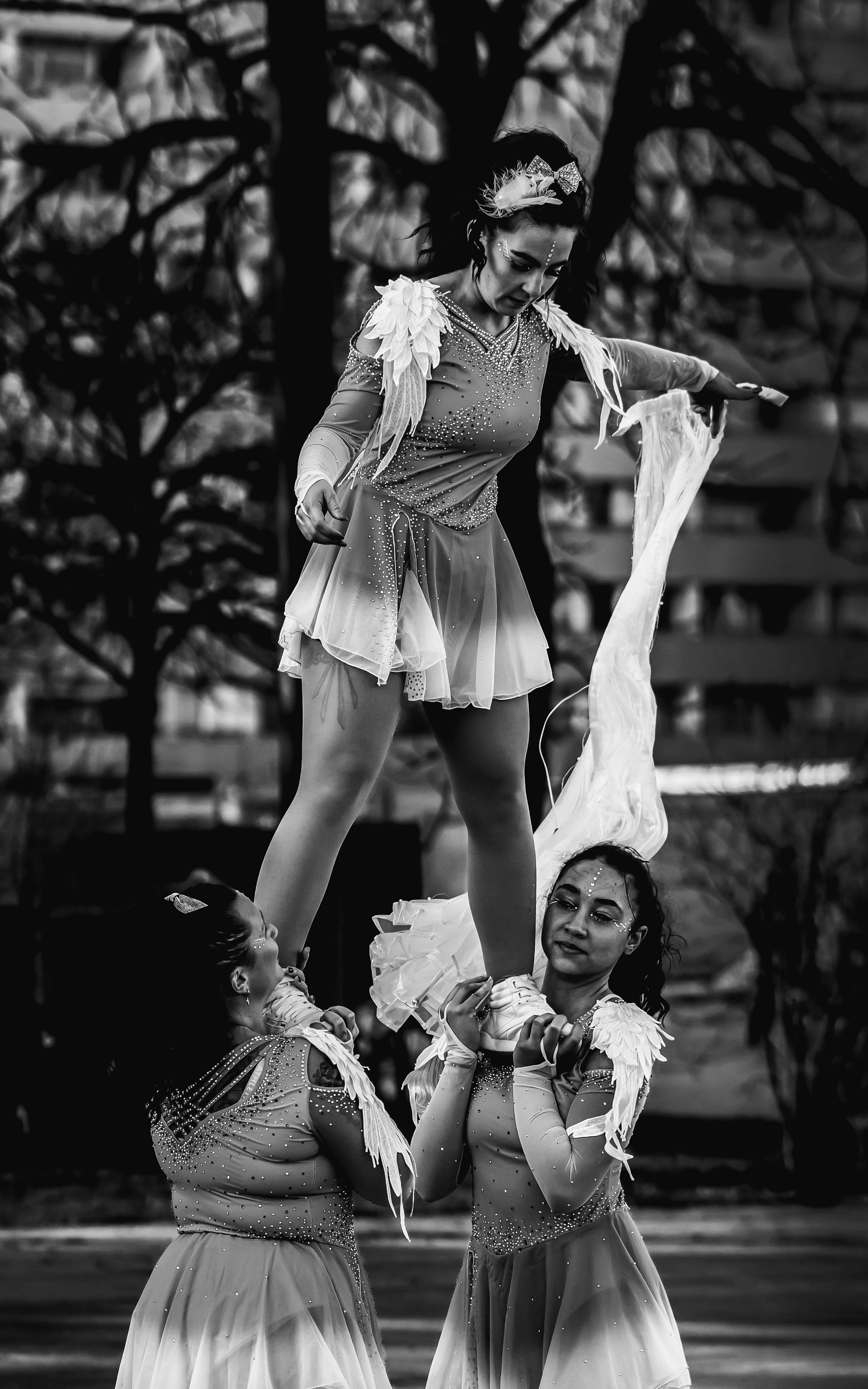 A couple of women standing on top of each other photo – Free Wallpaper ...