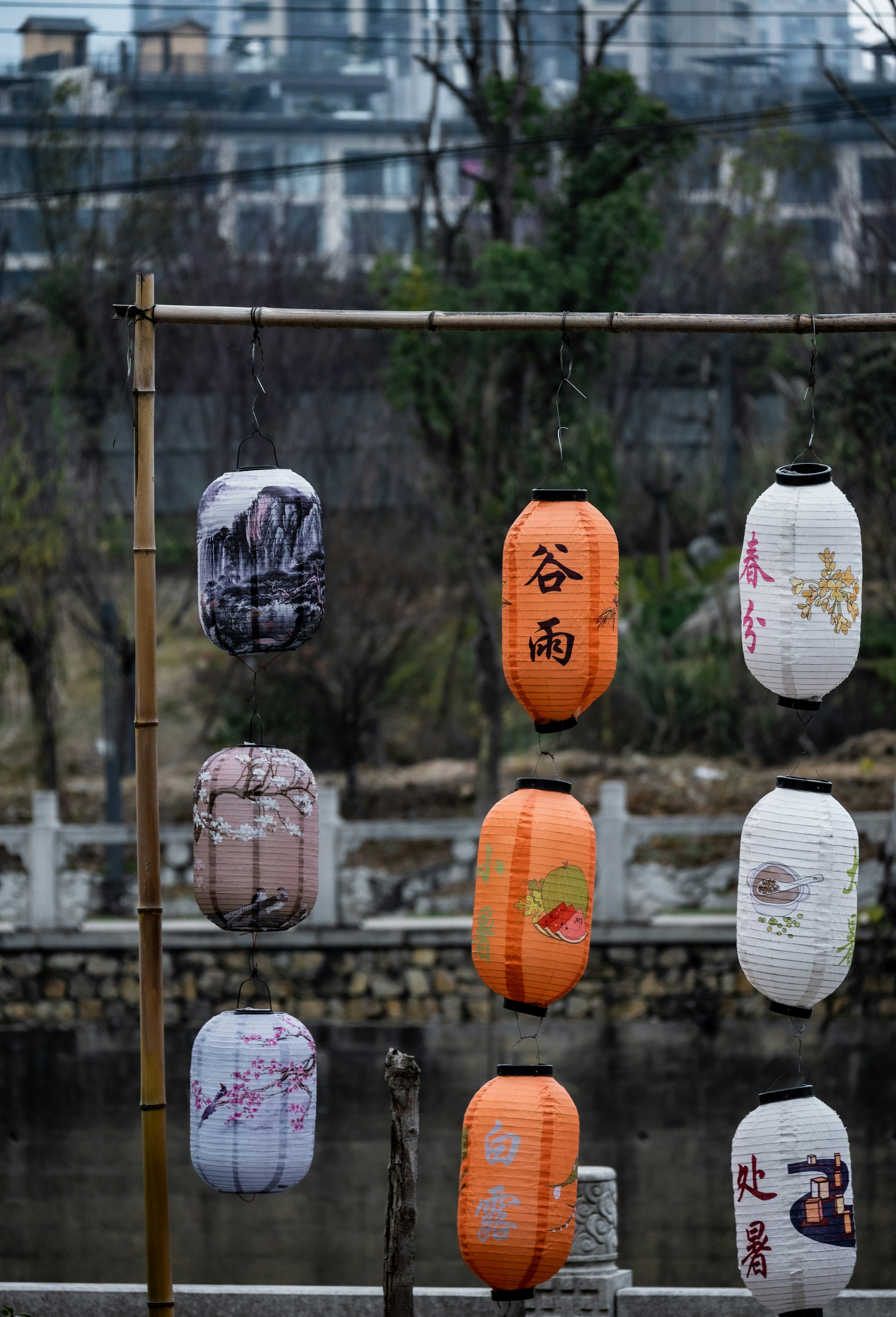 A bunch of paper lanterns hanging from a wire photo – Free China Image ...