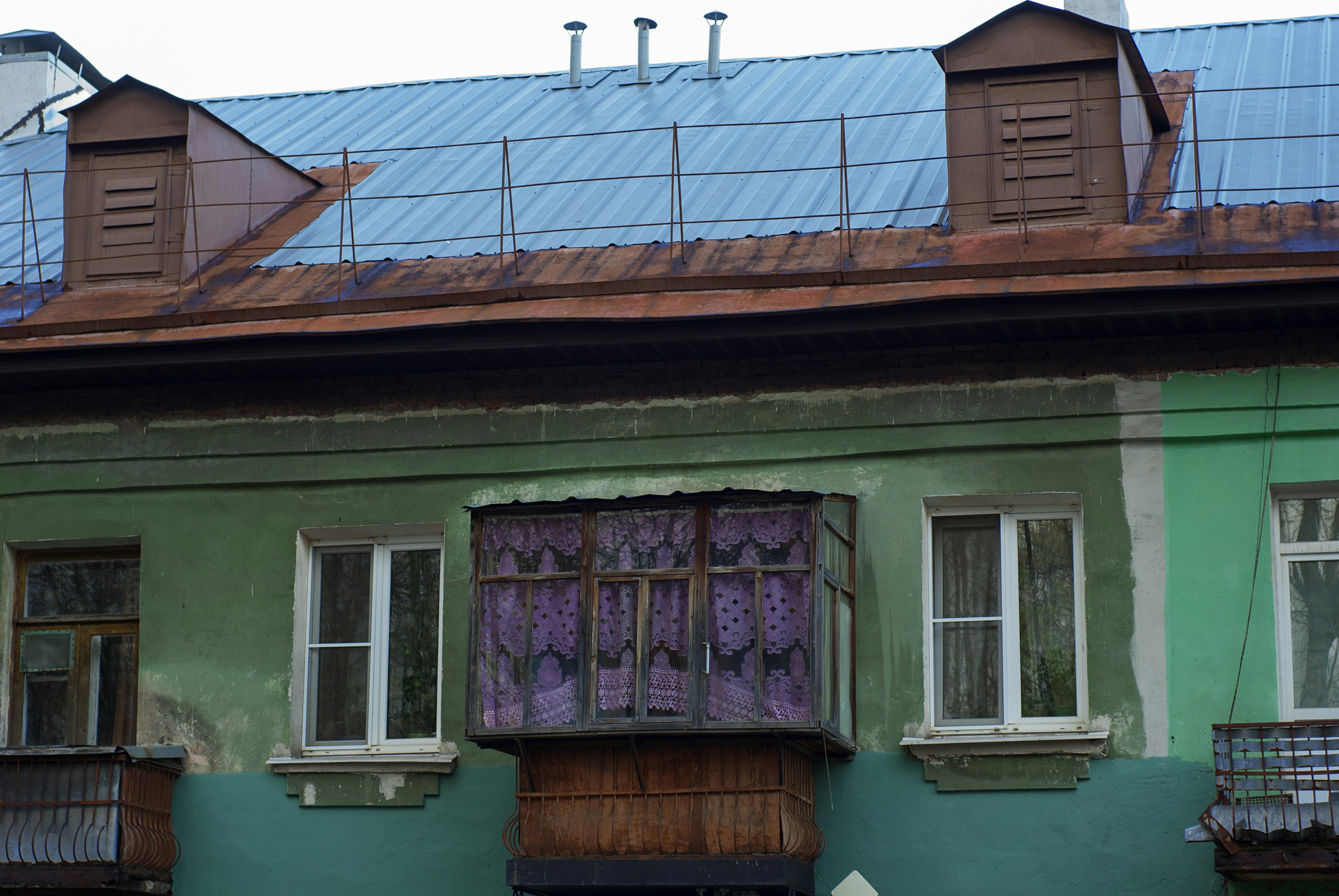 Facade with balcony of an old building