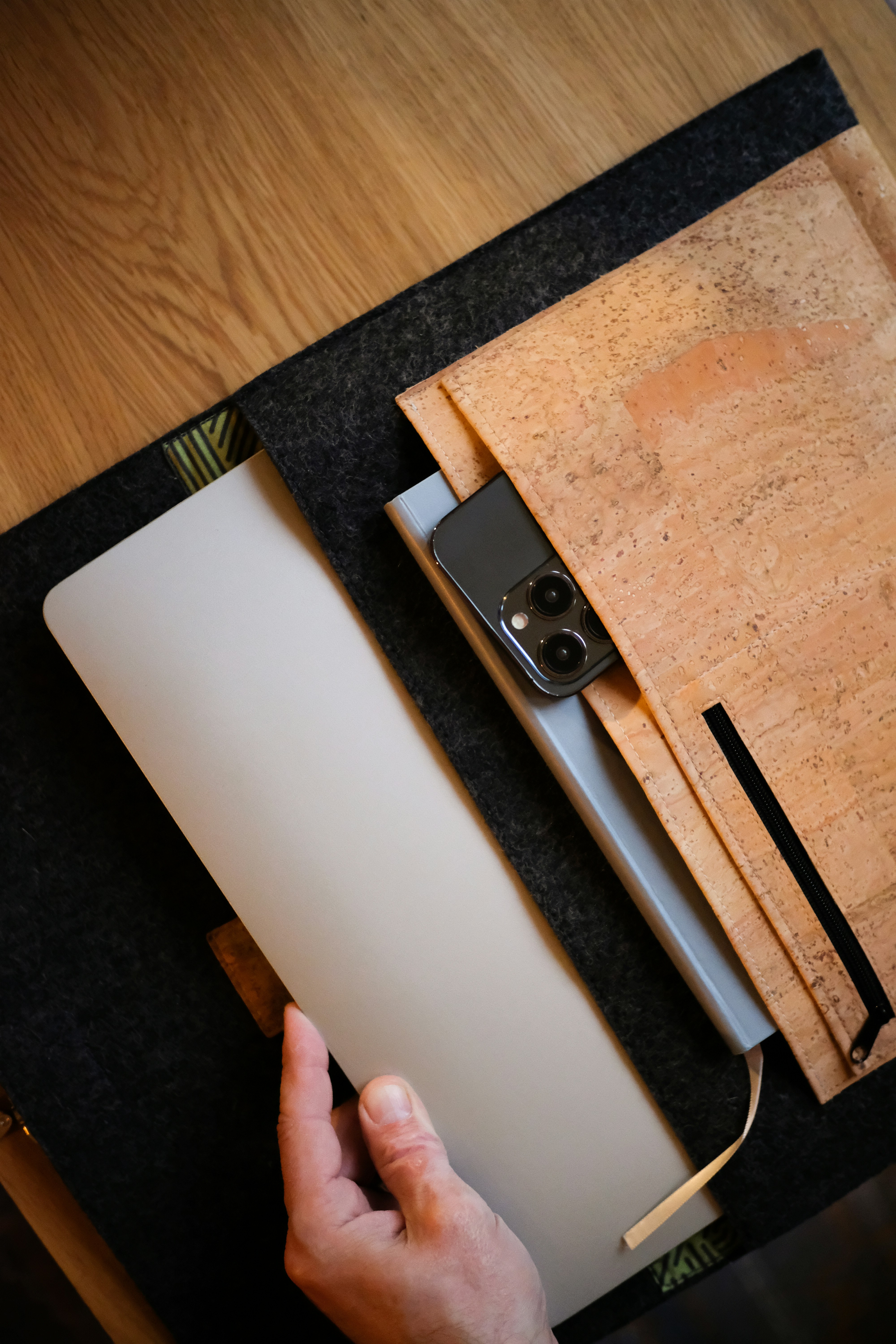 Perched Smartphone on a Sleek Laptop: A Quiet Desk Ritual