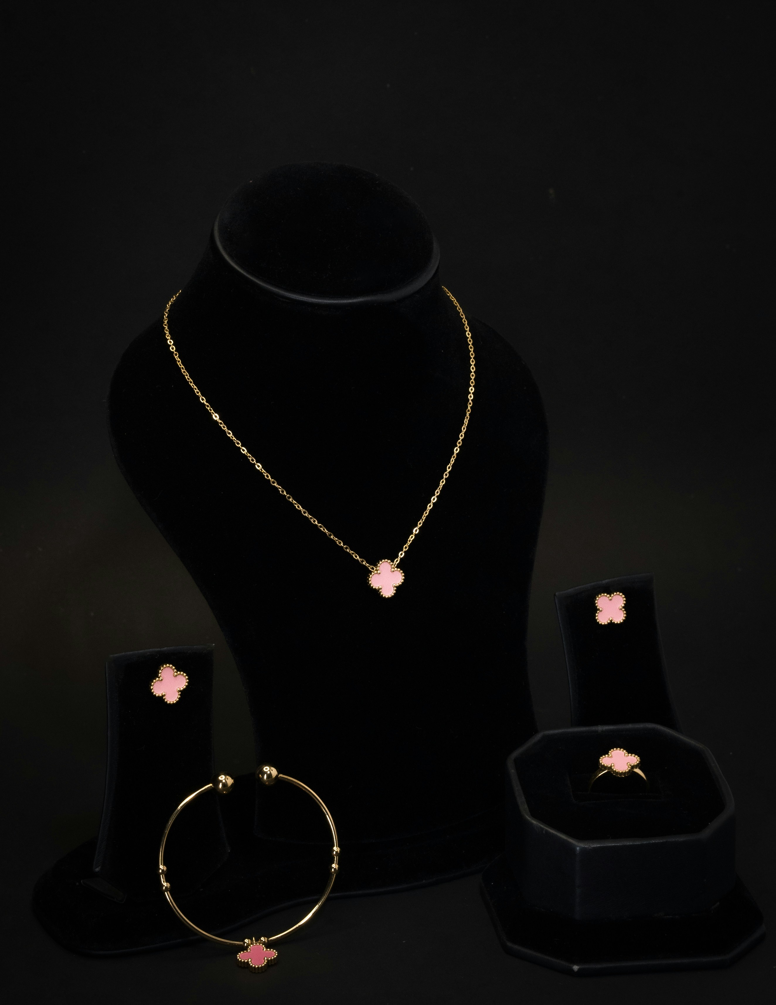 Rose Gold Blossom: Jewelry Pendant Centerpiece on Velvet Bust