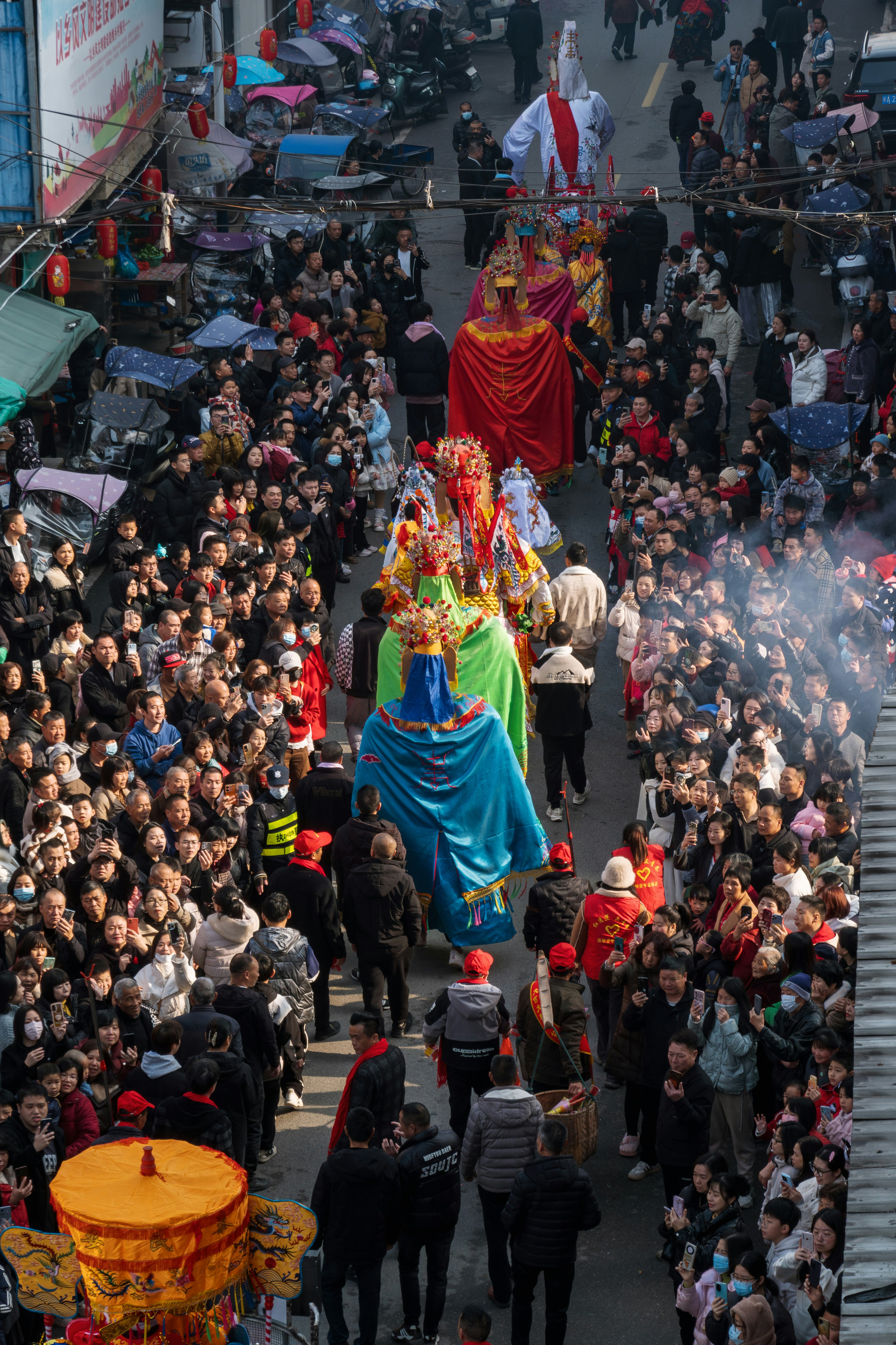 Colorful Procession Through a Crowded Street