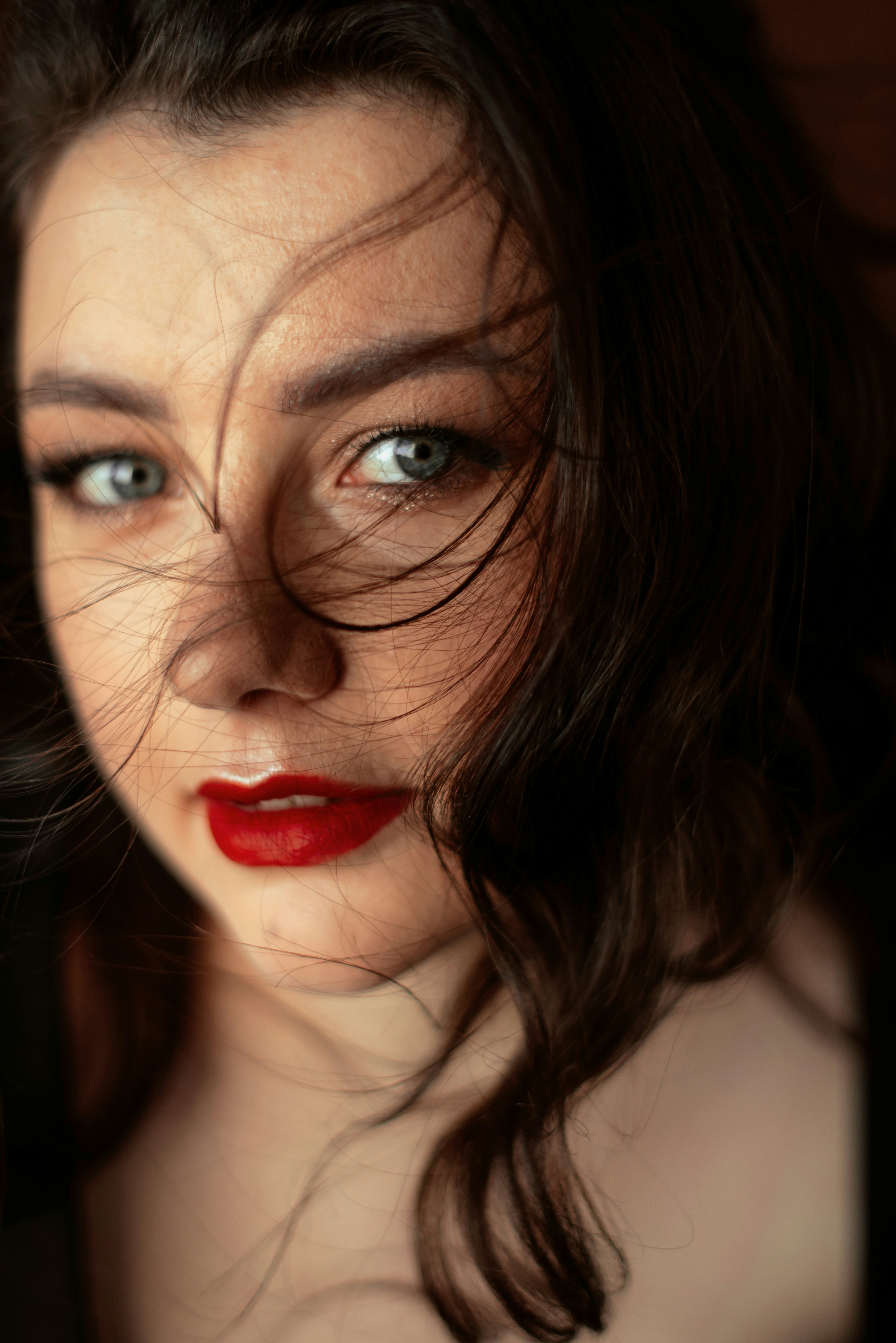 A woman with long hair and red lipstick photo – Free Woman Image on ...