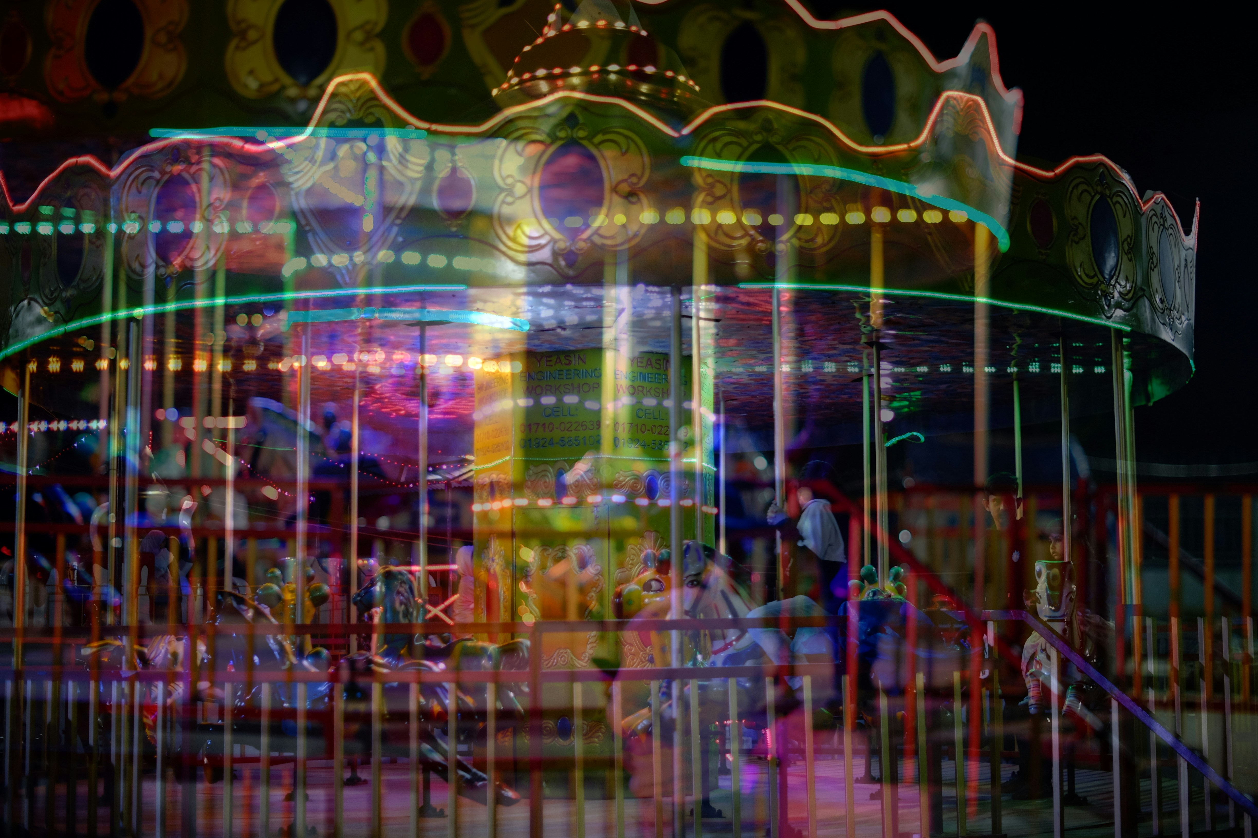 Pulse of Color: Night Carousel with Ribbon Light Trails