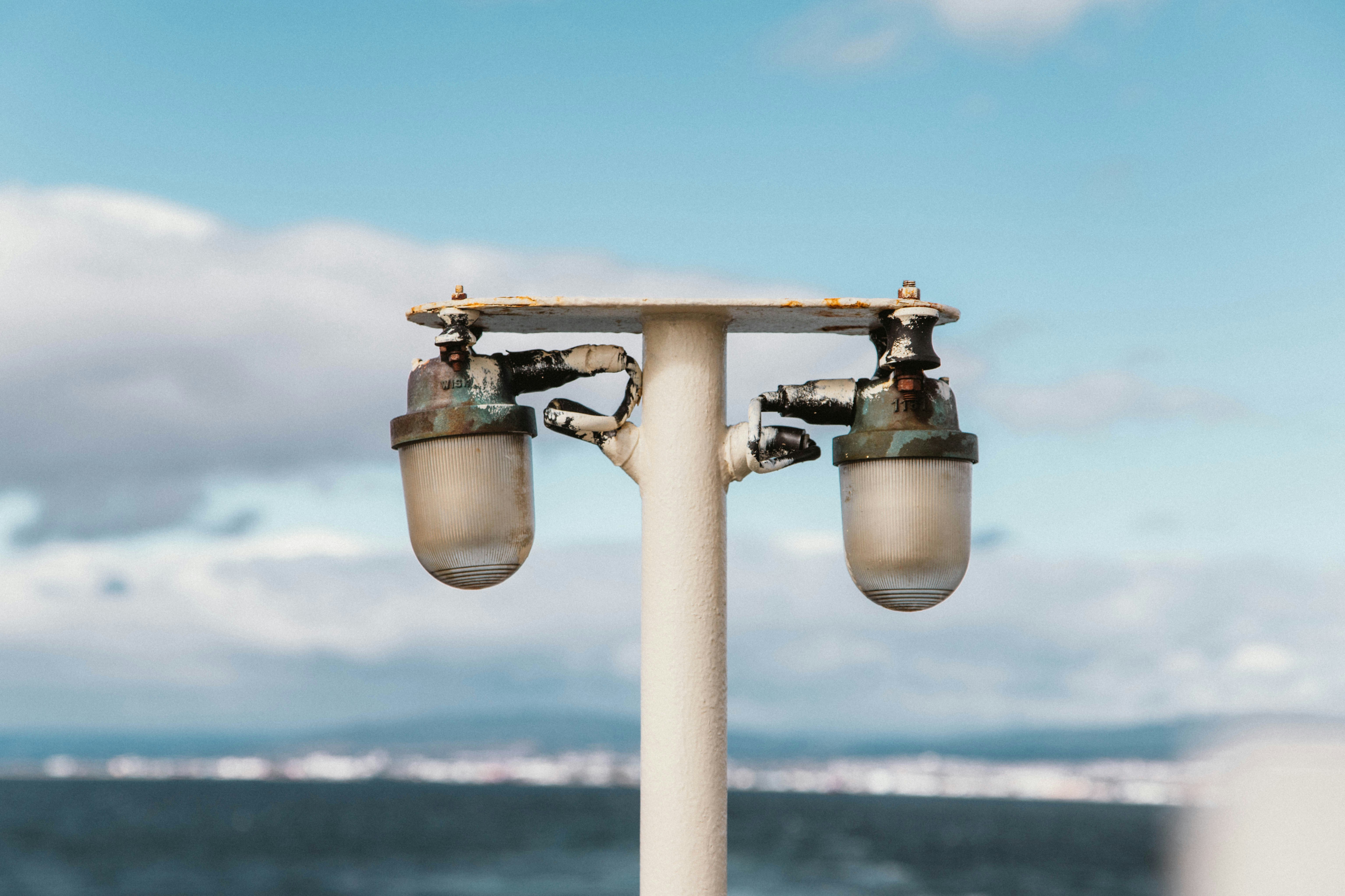 Twin Lanterns over a Calm Sea