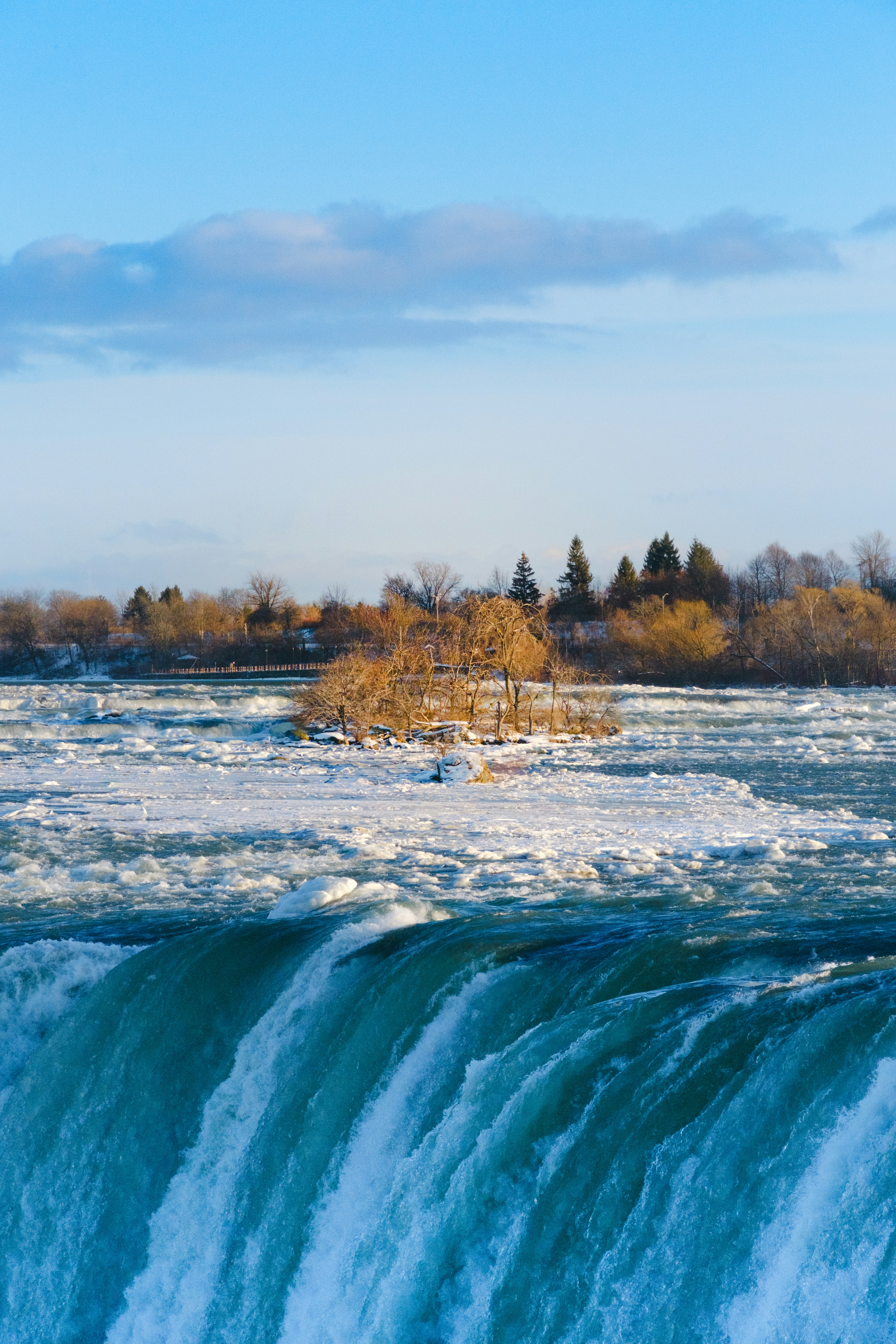 Blue Curtain Over the Falls: Winter Island in the Frozen Wake