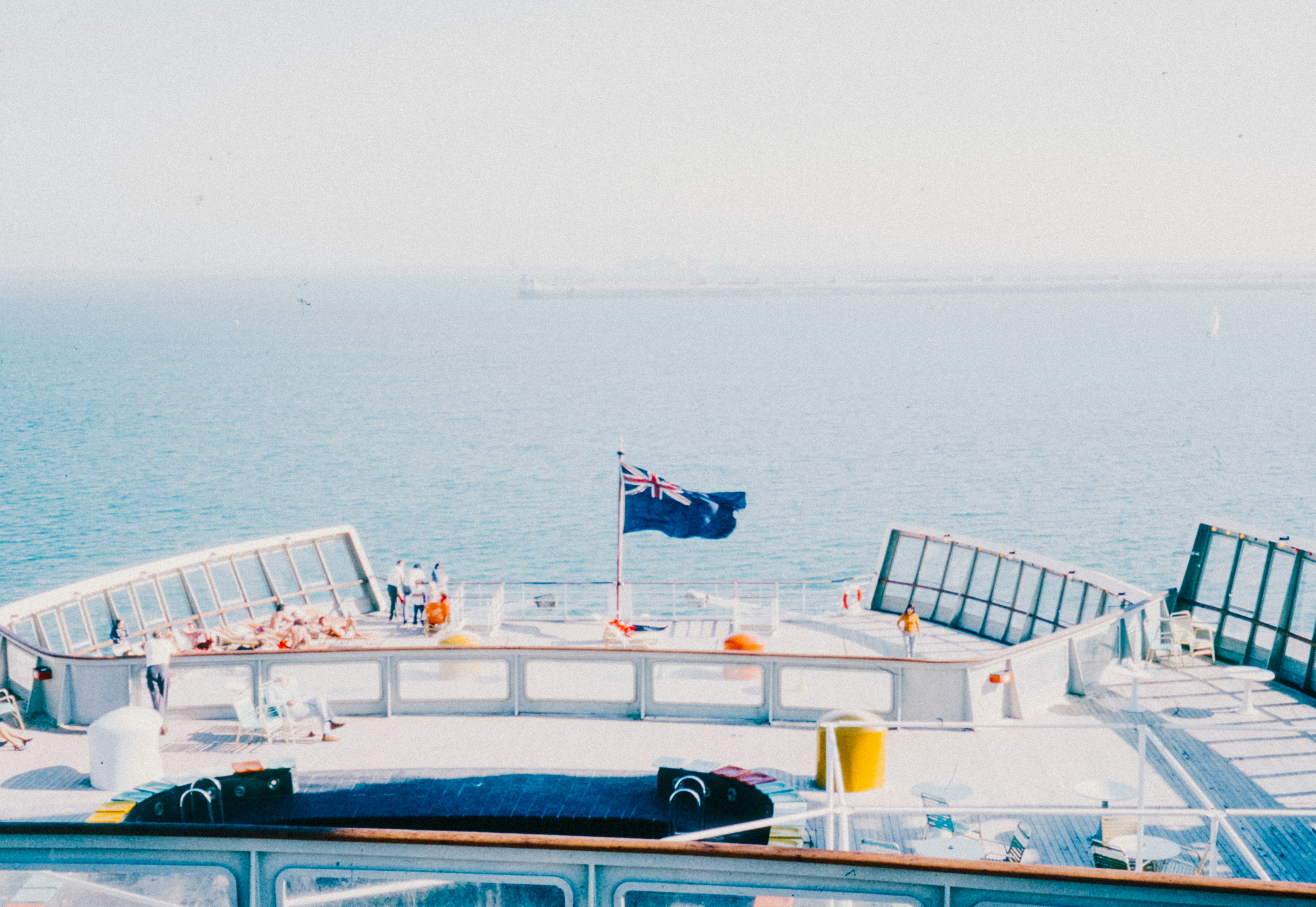 A view of the back of a boat on the water photo – Free Boat Image on ...
