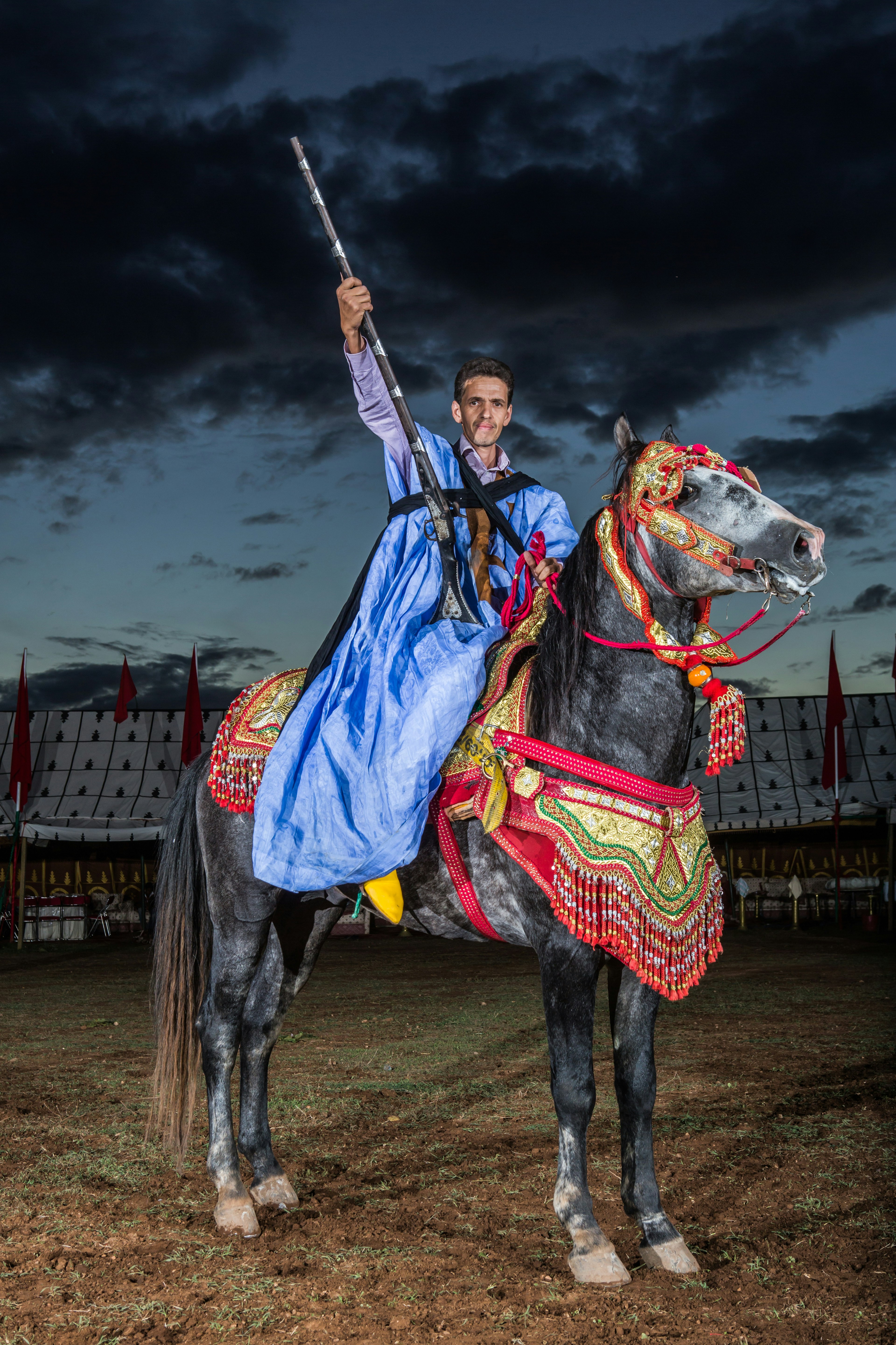 Lance High at Dusk: A Ceremonial Rider on a Bejeweled Steed