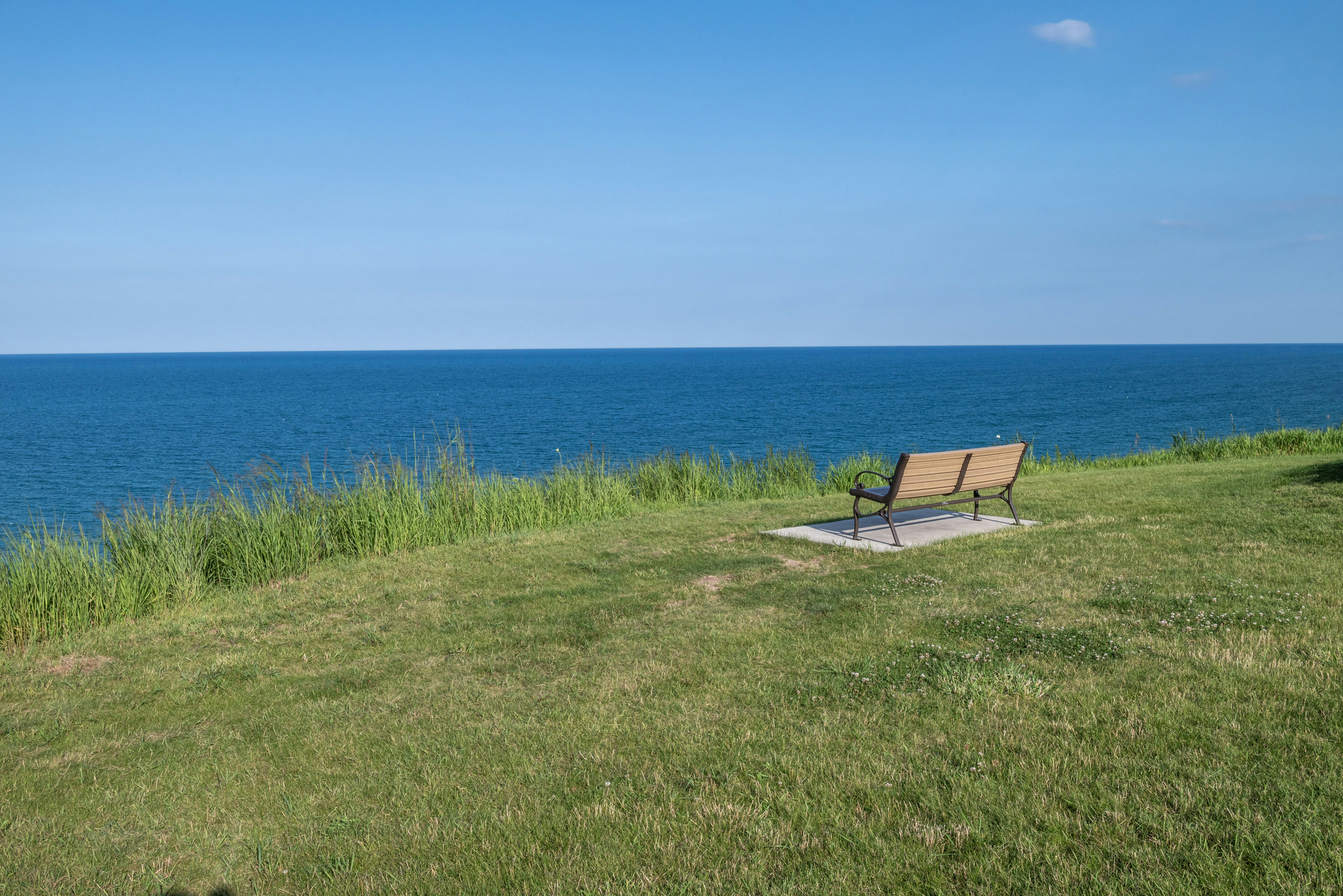 Photo of park bench overlooking Lake Michigan in Mequon, WI.