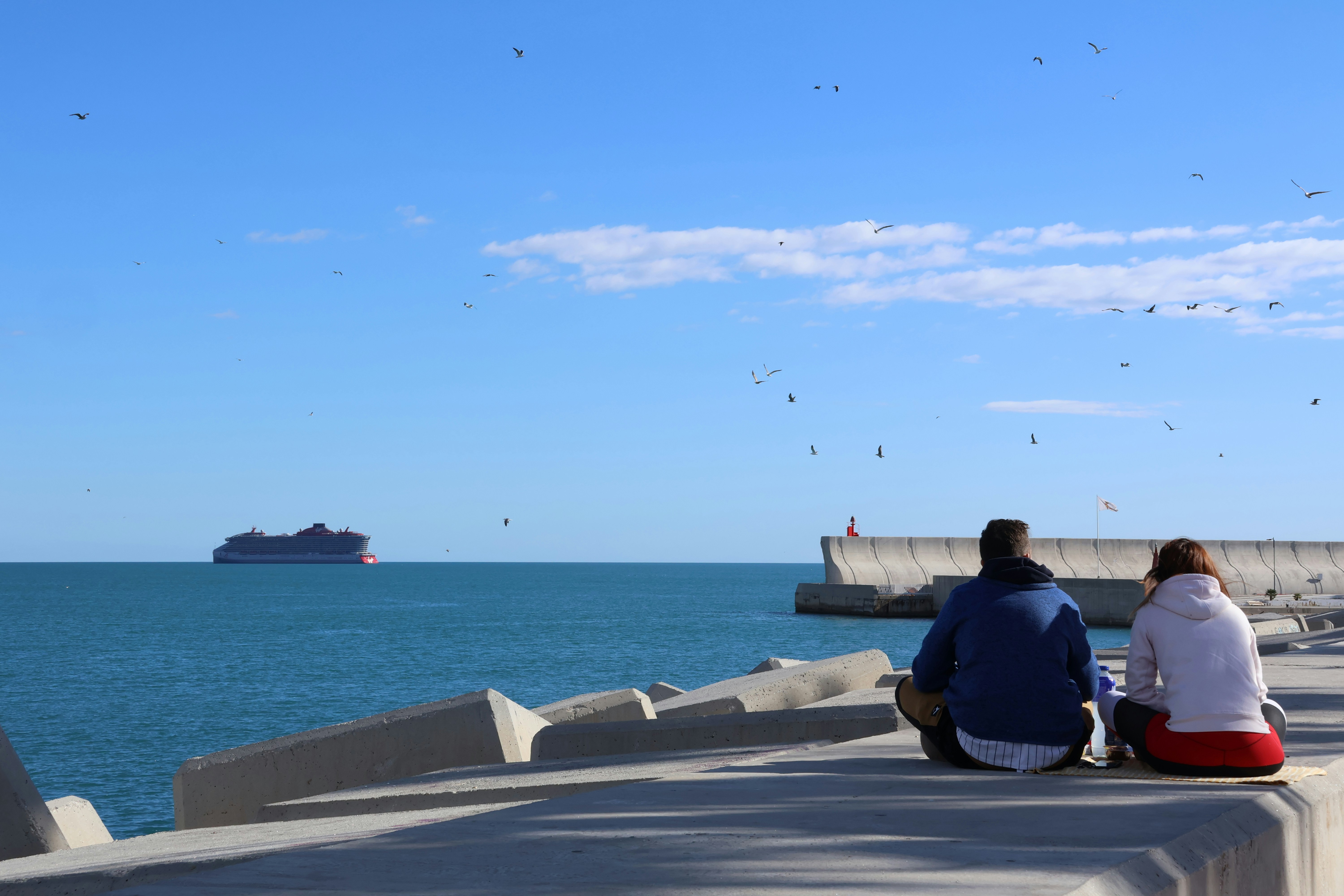 Courtyard by the Sea: A Quiet Moment on the Concrete Breakwater