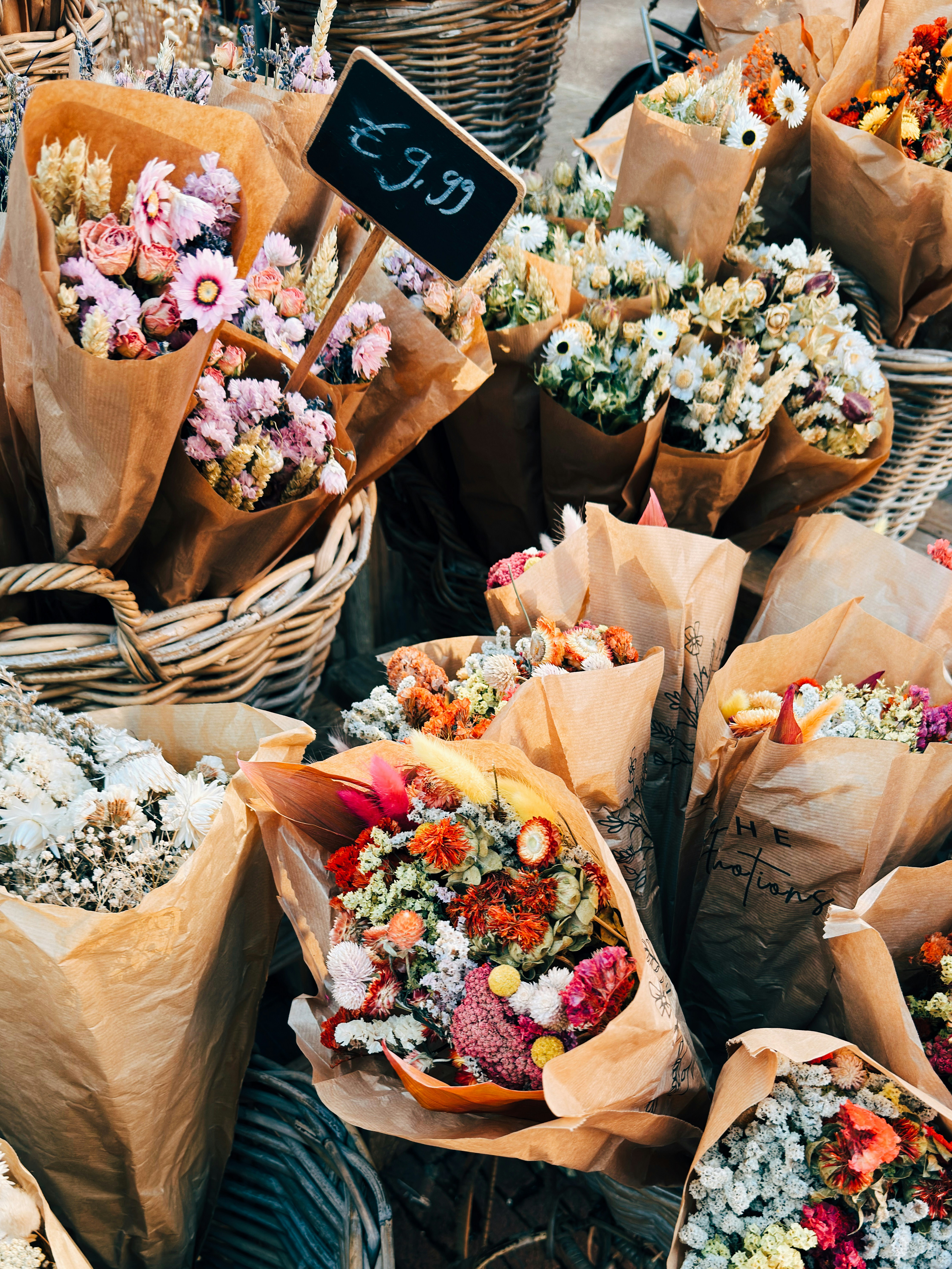 A bunch of baskets filled with lots of flowers photo – Free Flower ...