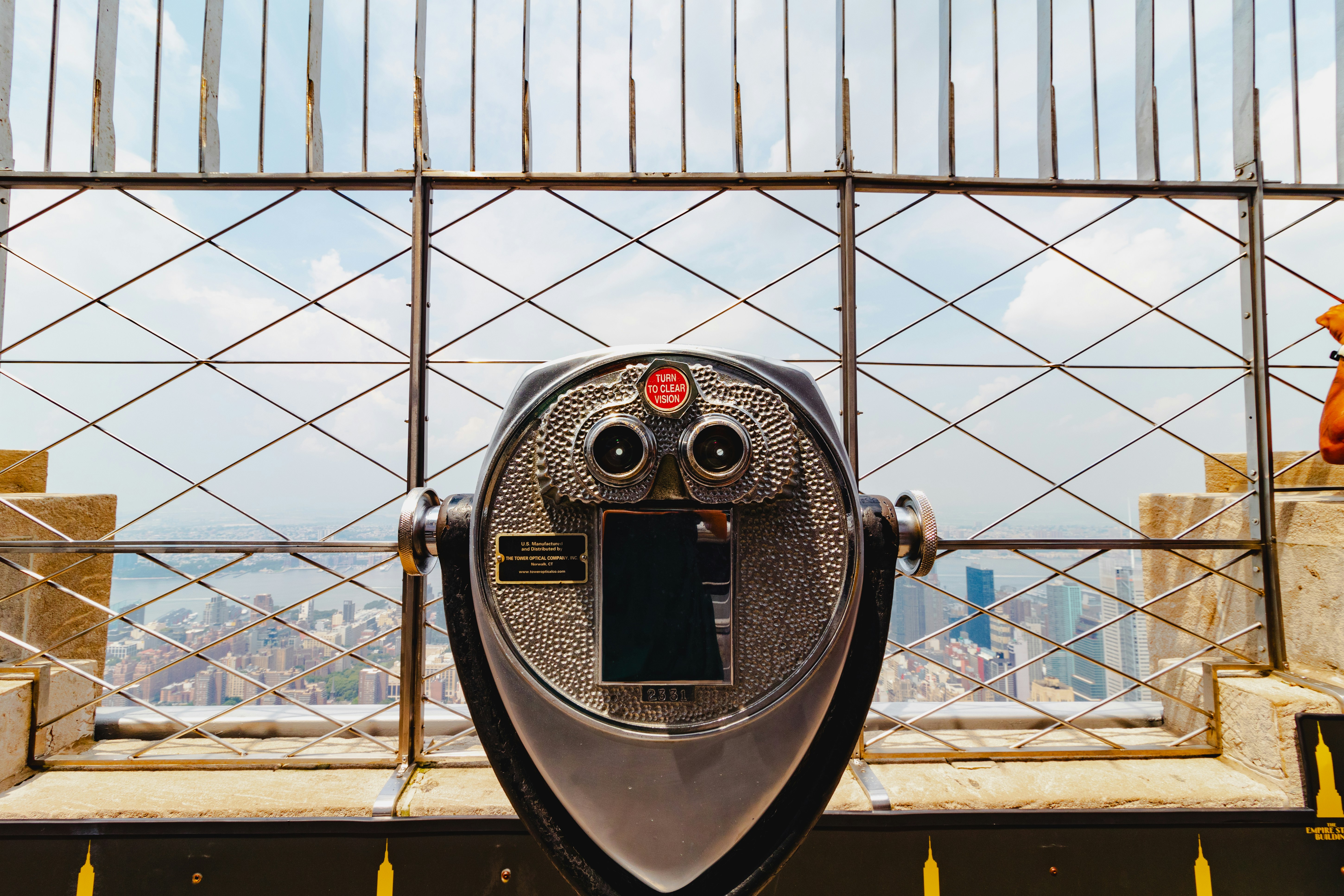 A parking meter sitting on top of a building