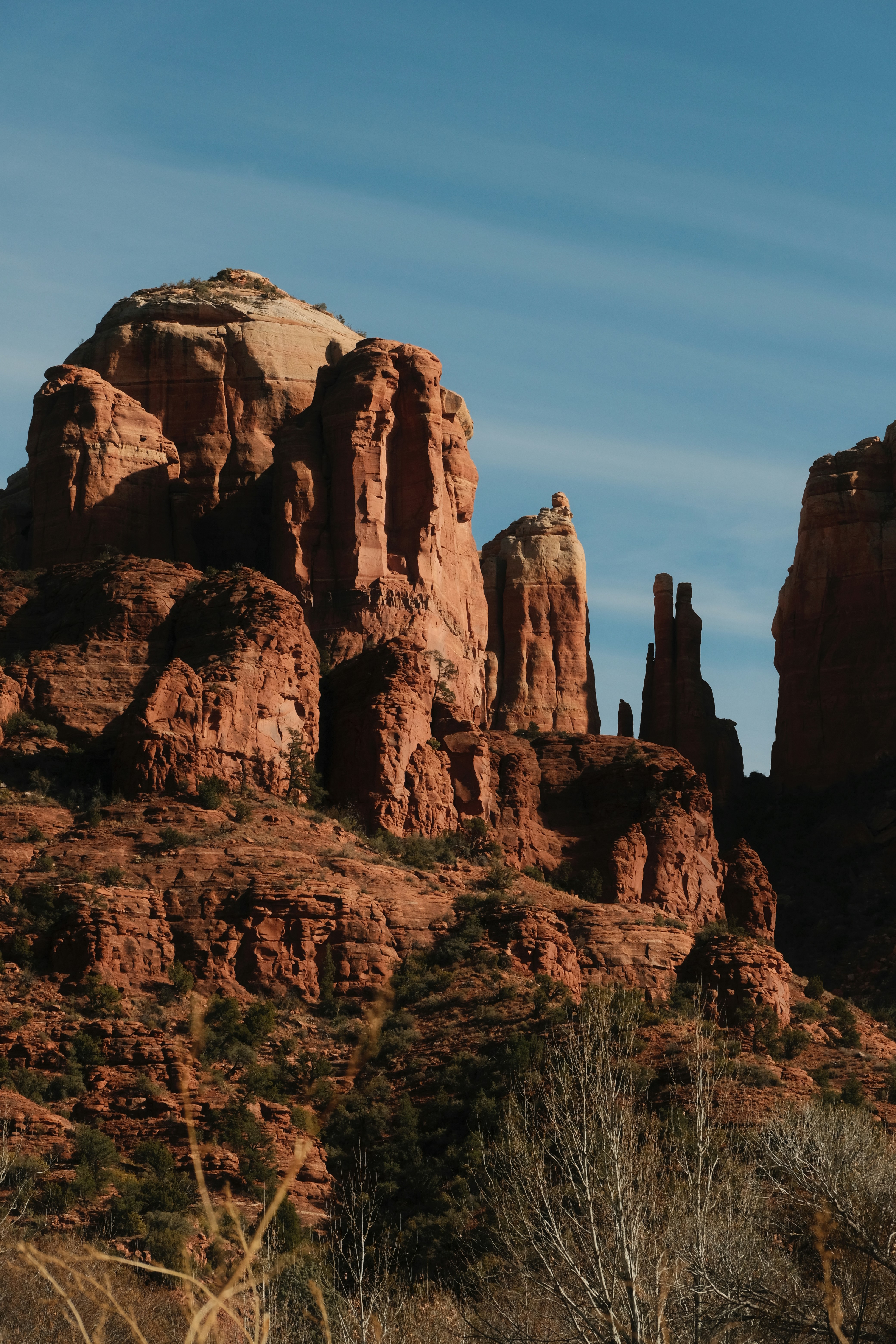 A large rock formation in the middle of a desert photo – Free Sedona ...