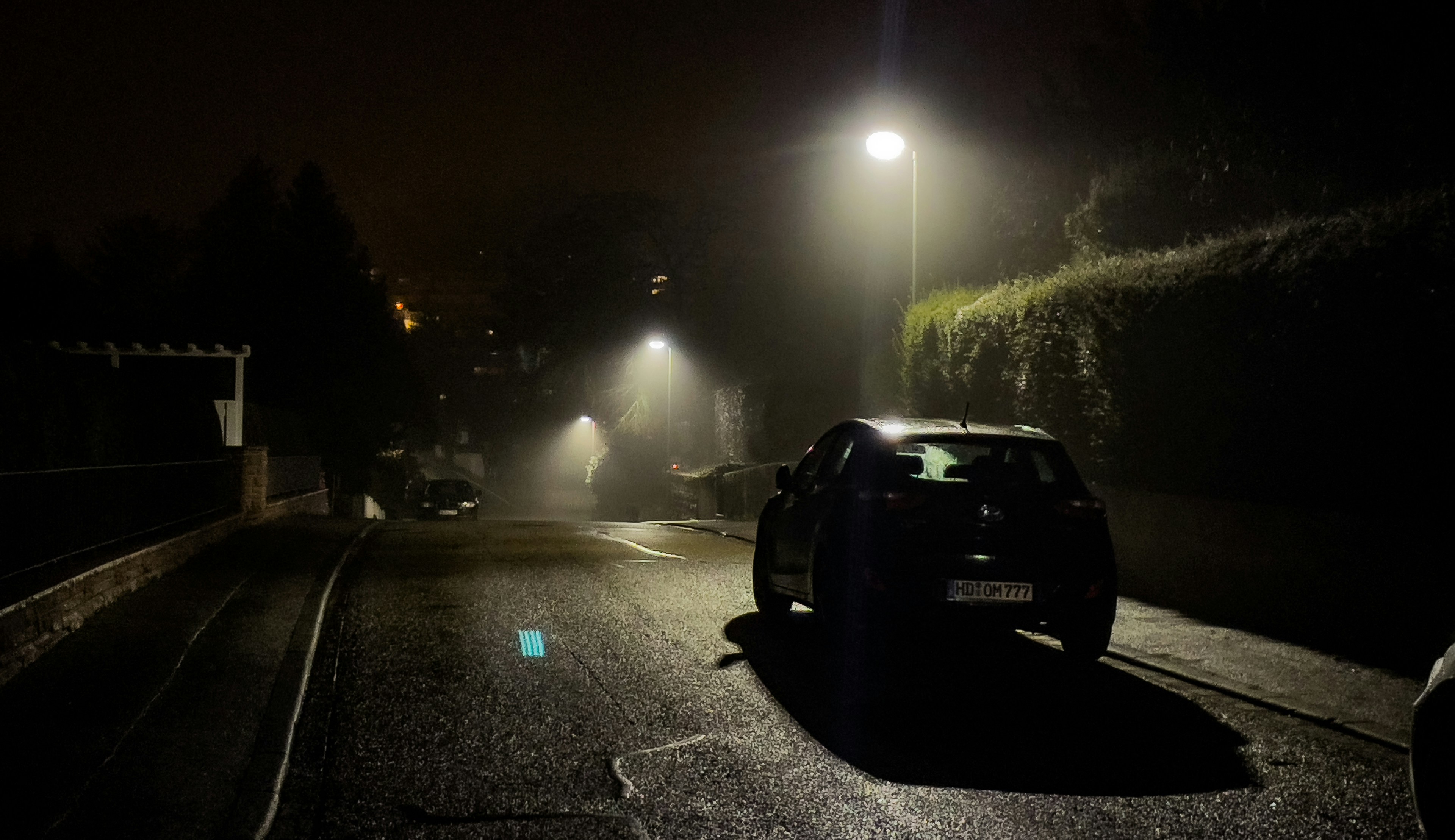 Whispering Glow on a Misty Road